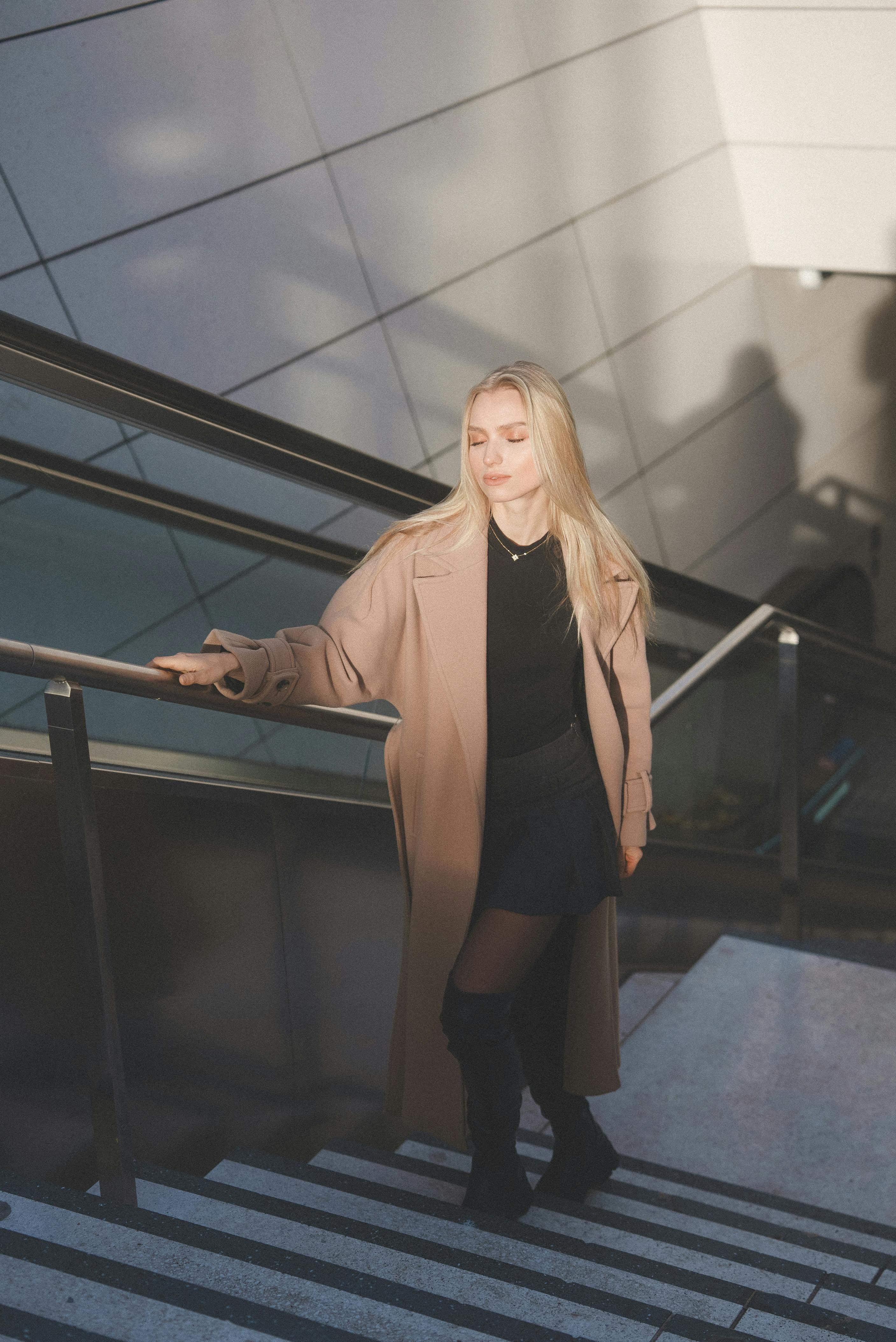Models in Suits Standing on Stair Steps · Free Stock Photo