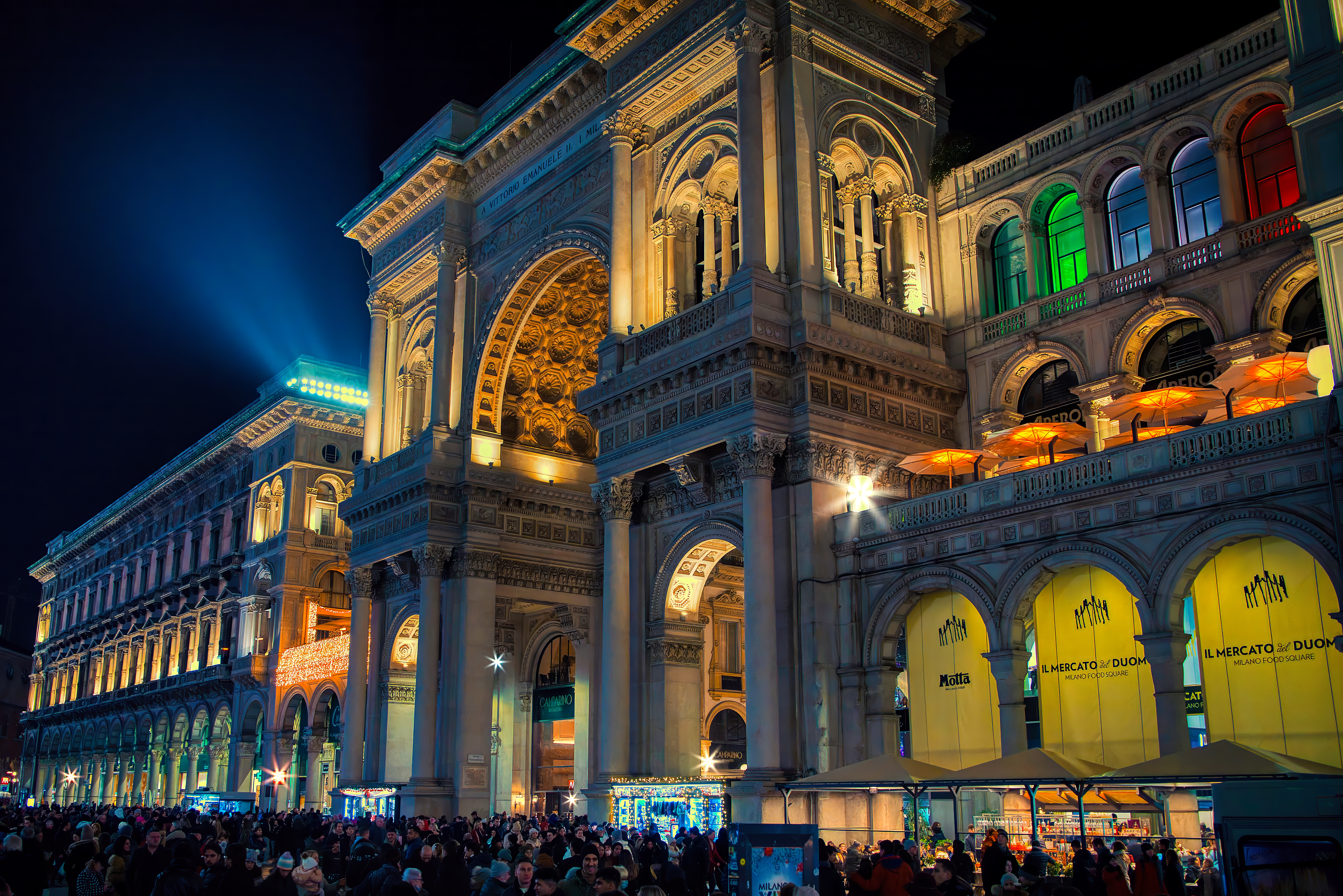 View a Crowded Square in Front of Illuminated Galleria Vittorio ...