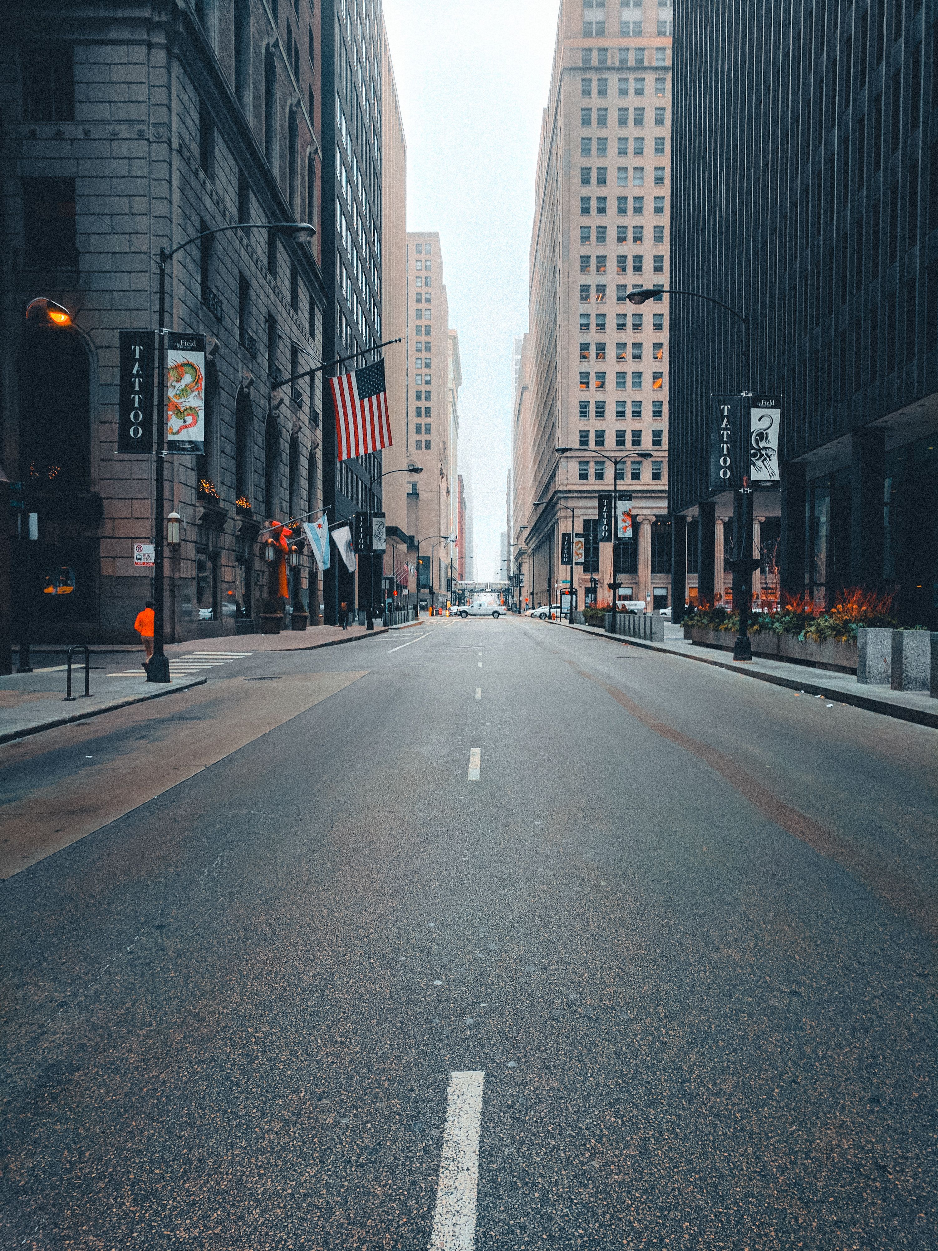 An empty street with buildings on both sides · Free Stock Photo