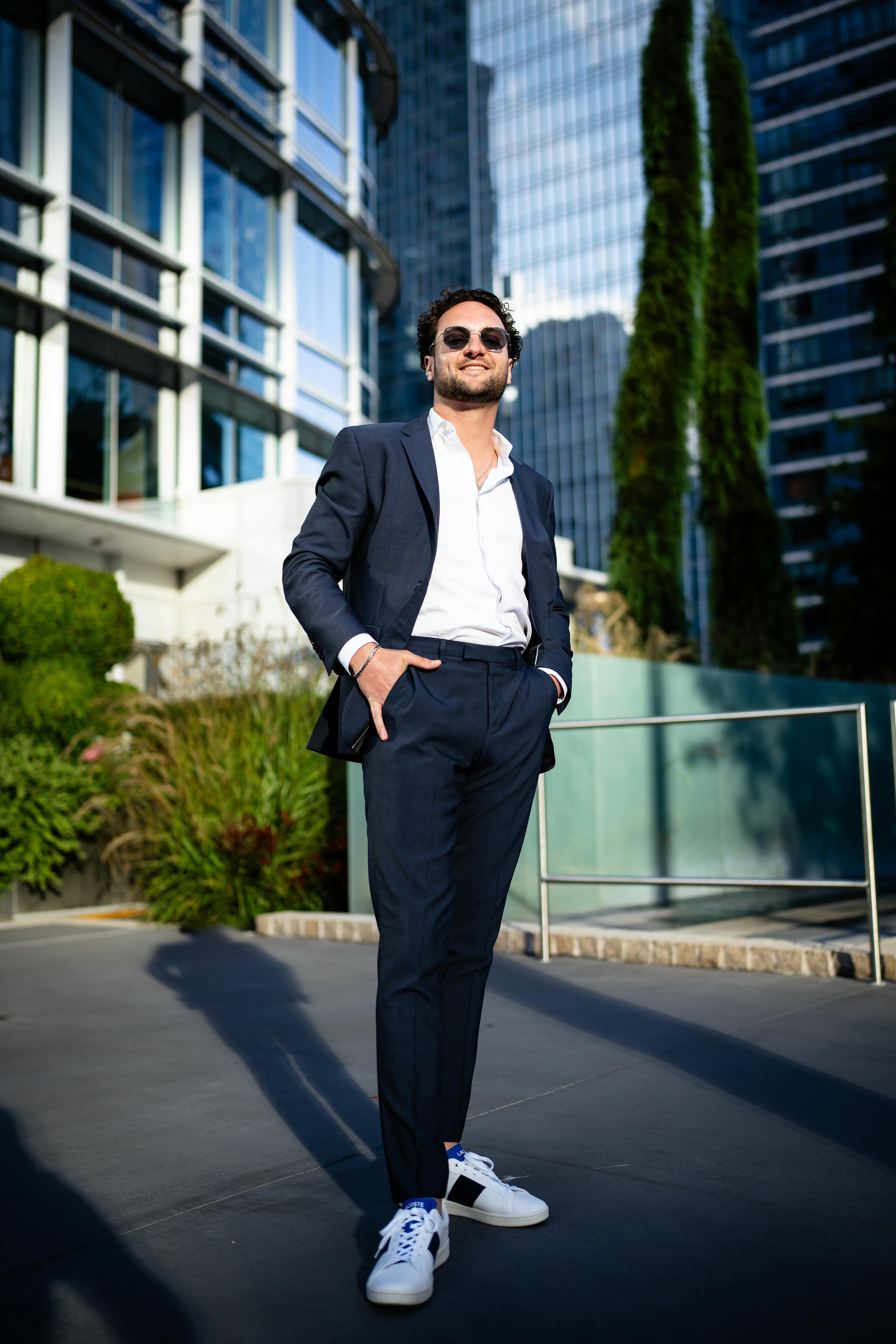 Smiling Man in Suit and Sunglasses · Free Stock Photo