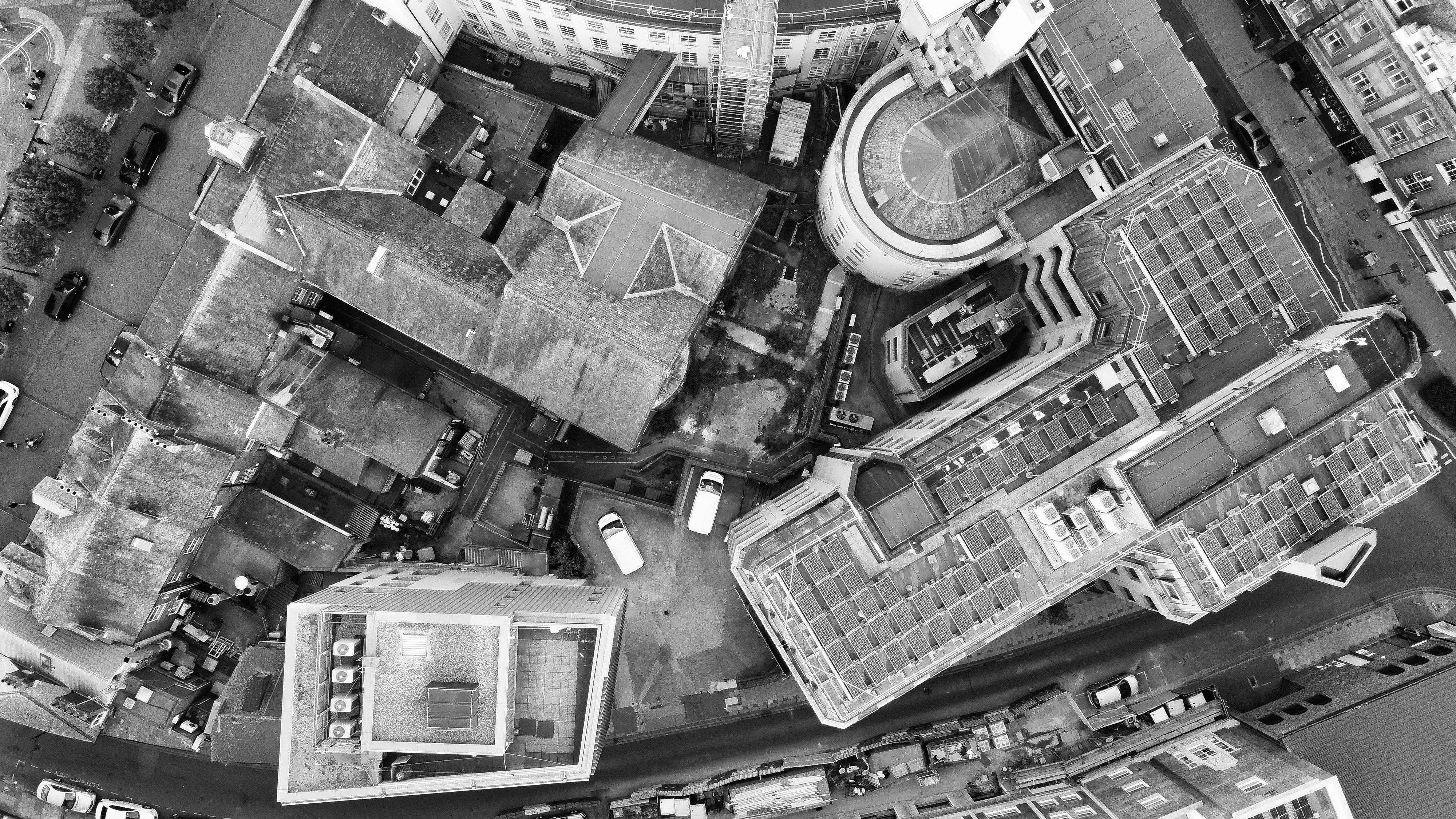 Black and White Top View of Buildings and Streets in City · Free Stock ...