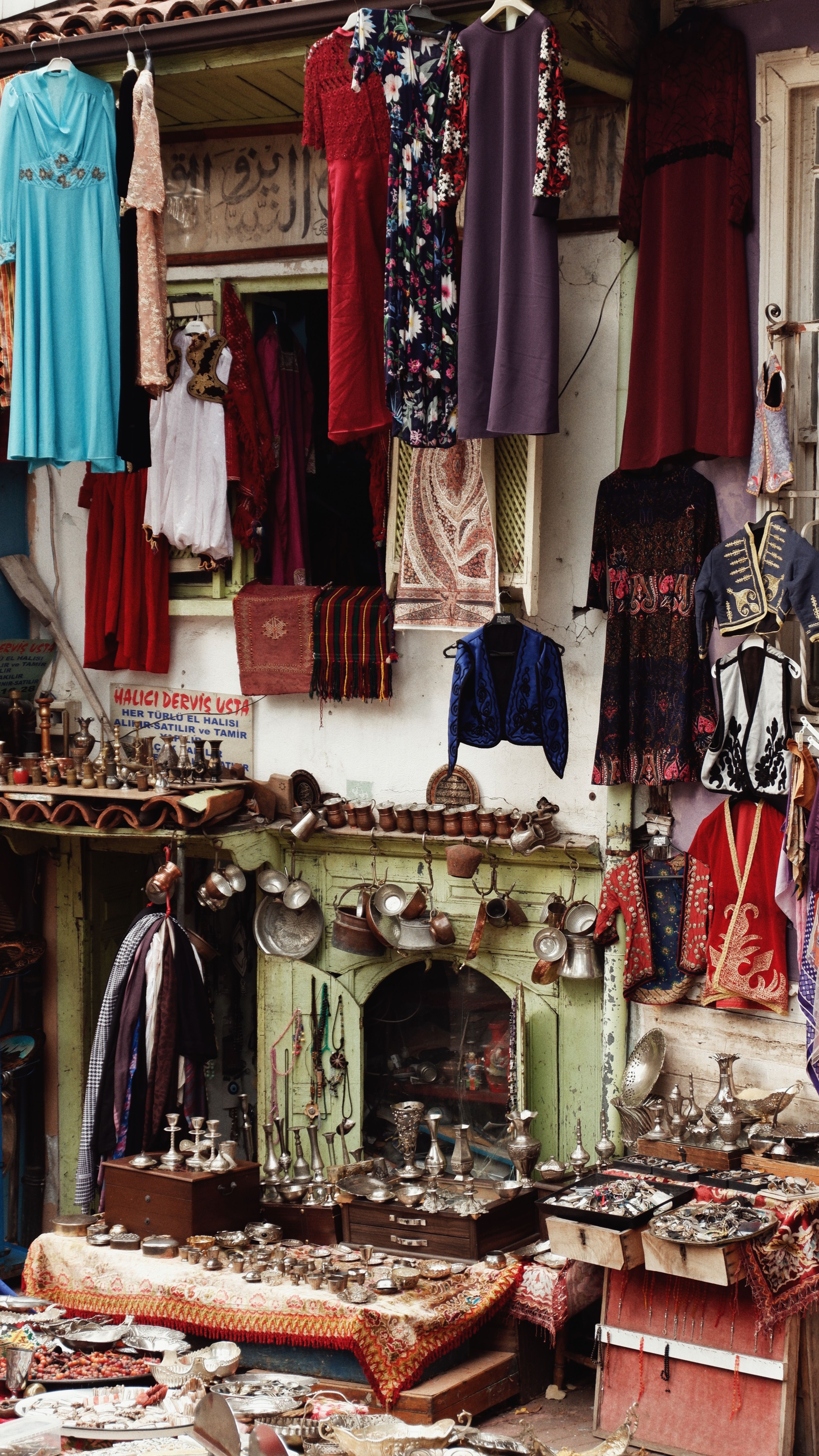 Clothes and Traditional Pottery Displayed in front of a Shop · Free ...