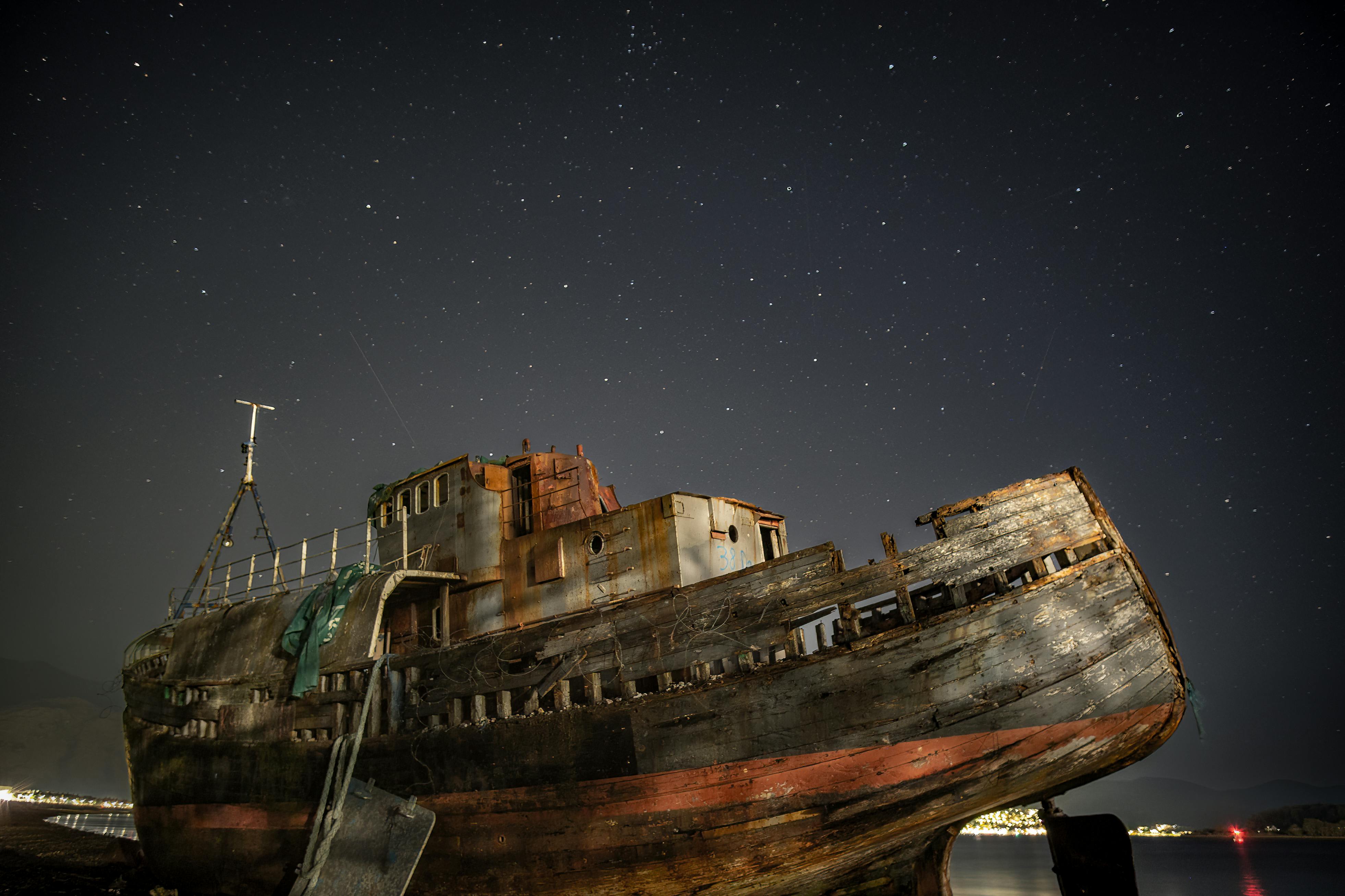 View of the Corpach Shipwreck under a Starry Night Sky · Free Stock Photo