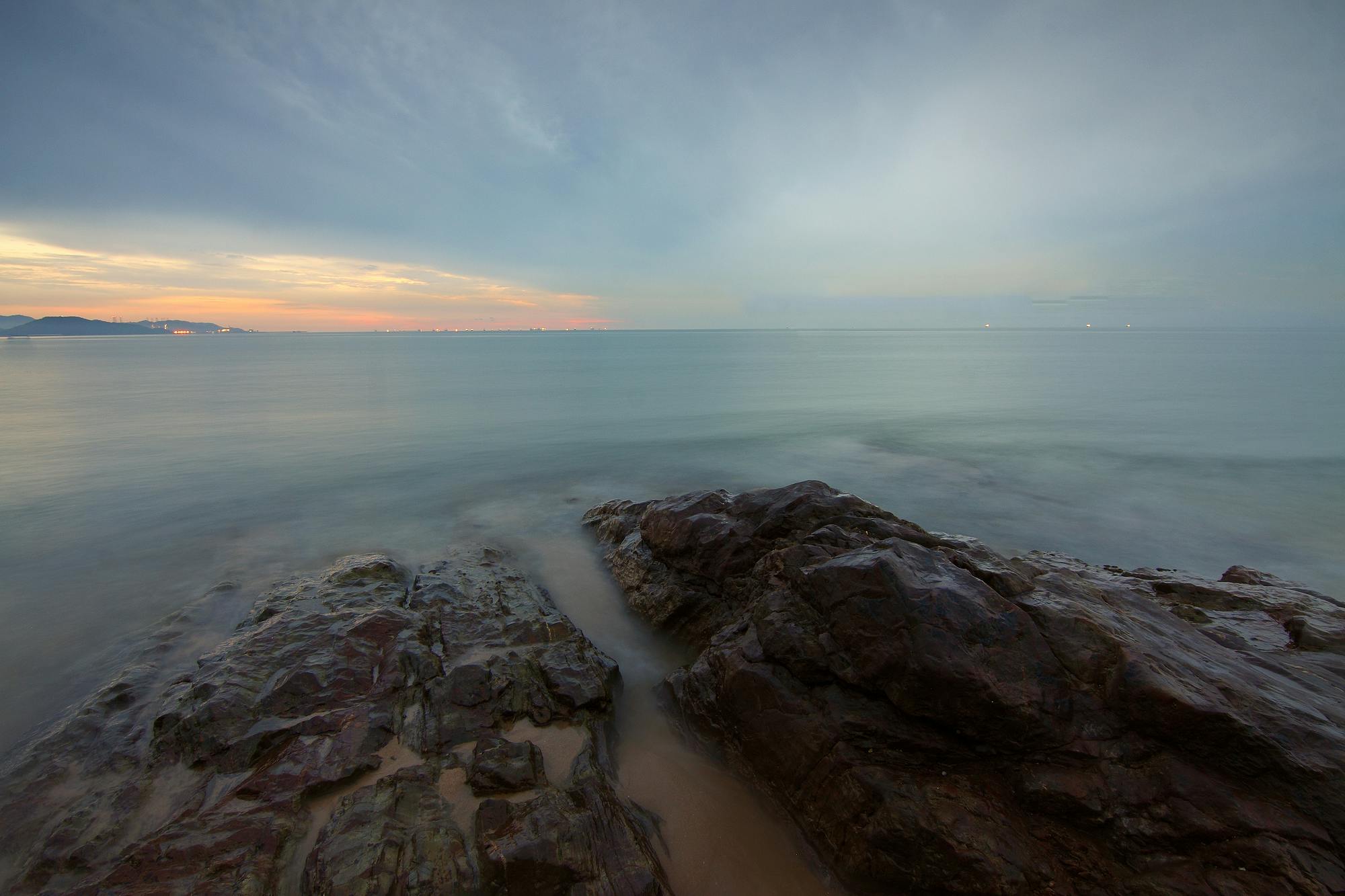 Rock Formation Surrounded by Sea during Daytime · Free Stock Photo