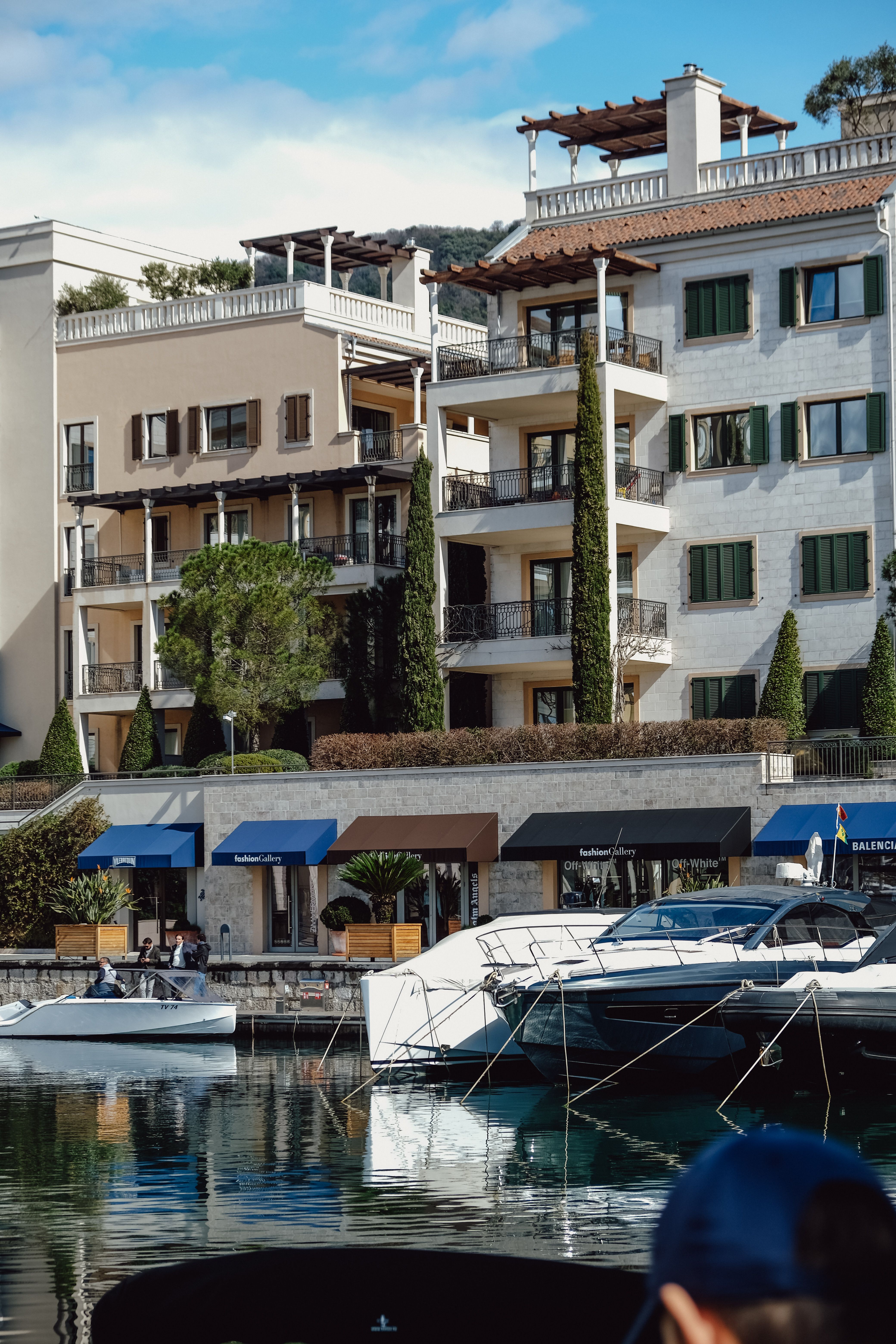 Boats Moored to the Promenade and Waterfront Buildings in City · Free ...
