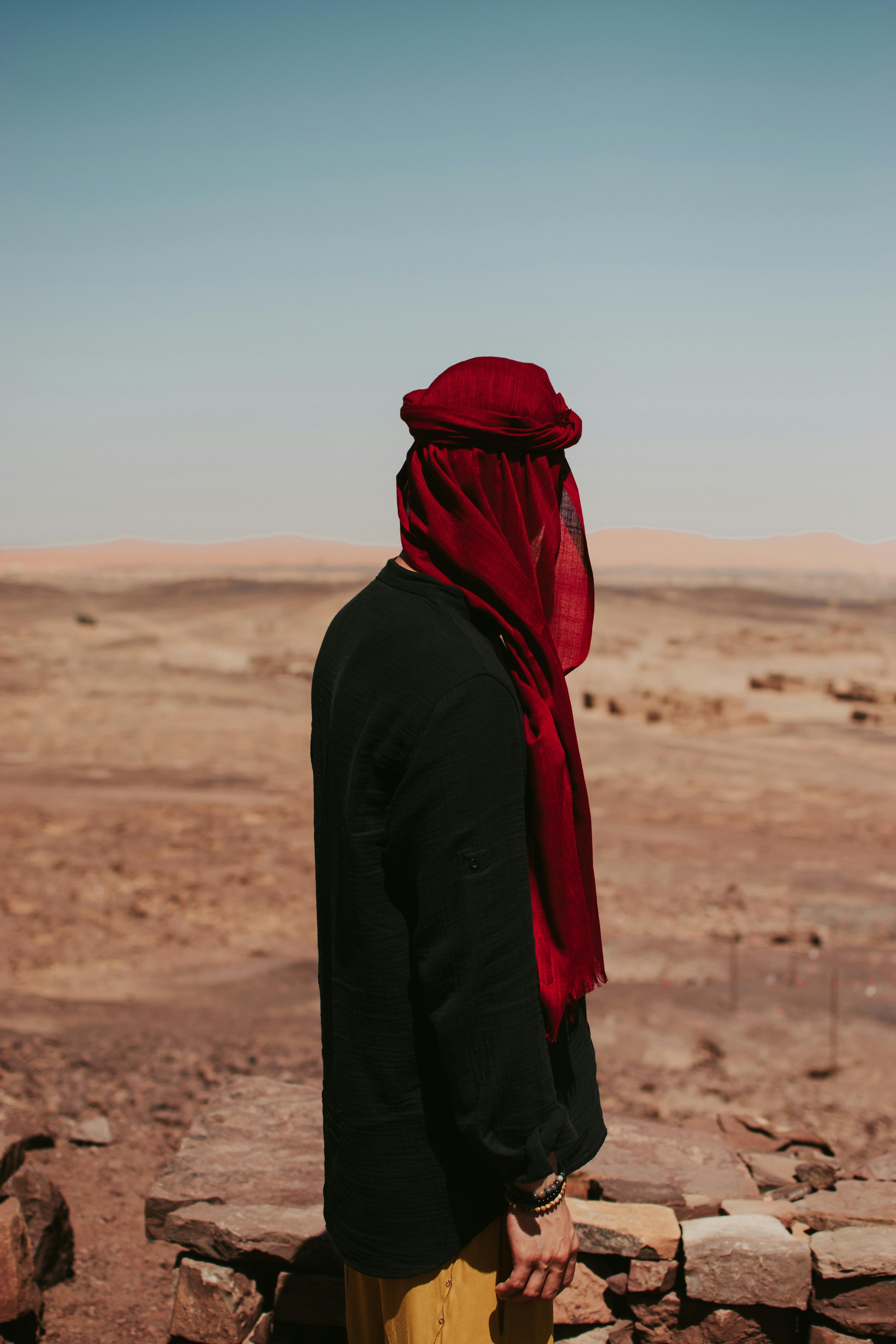 Man With a Headscarf on a Desert · Free Stock Photo