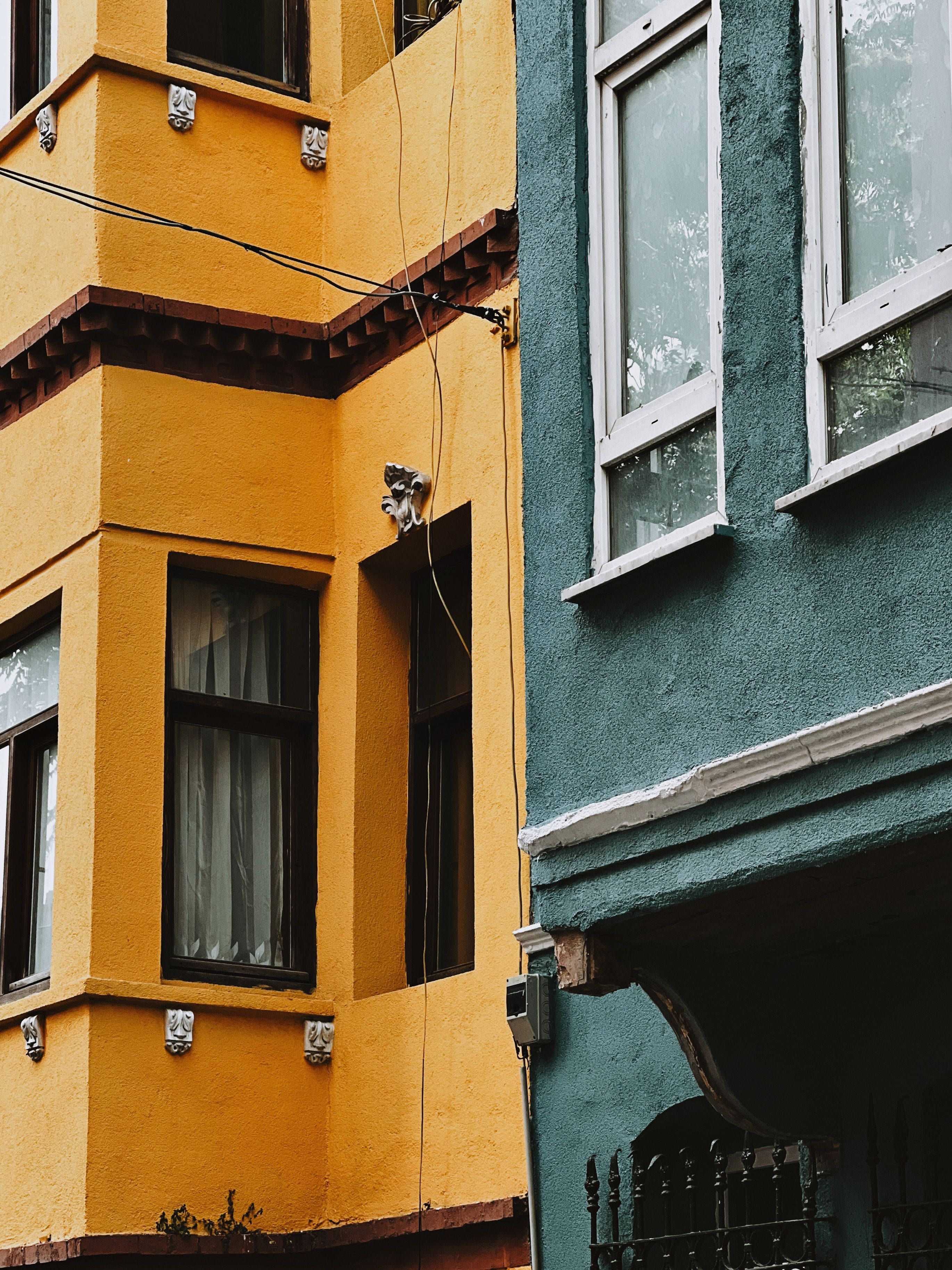 Windows of Two Adjacent Townhouses · Free Stock Photo