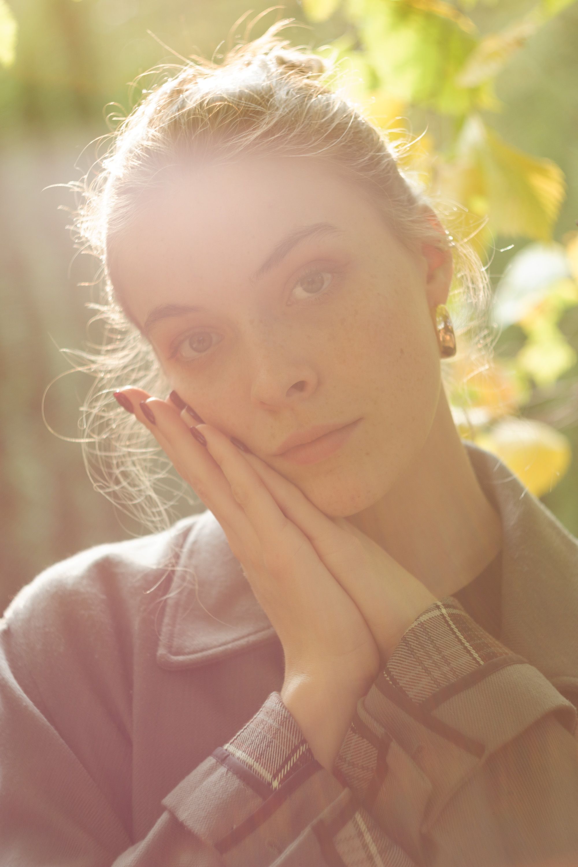 Portrait of a Woman in Sunlight · Free Stock Photo