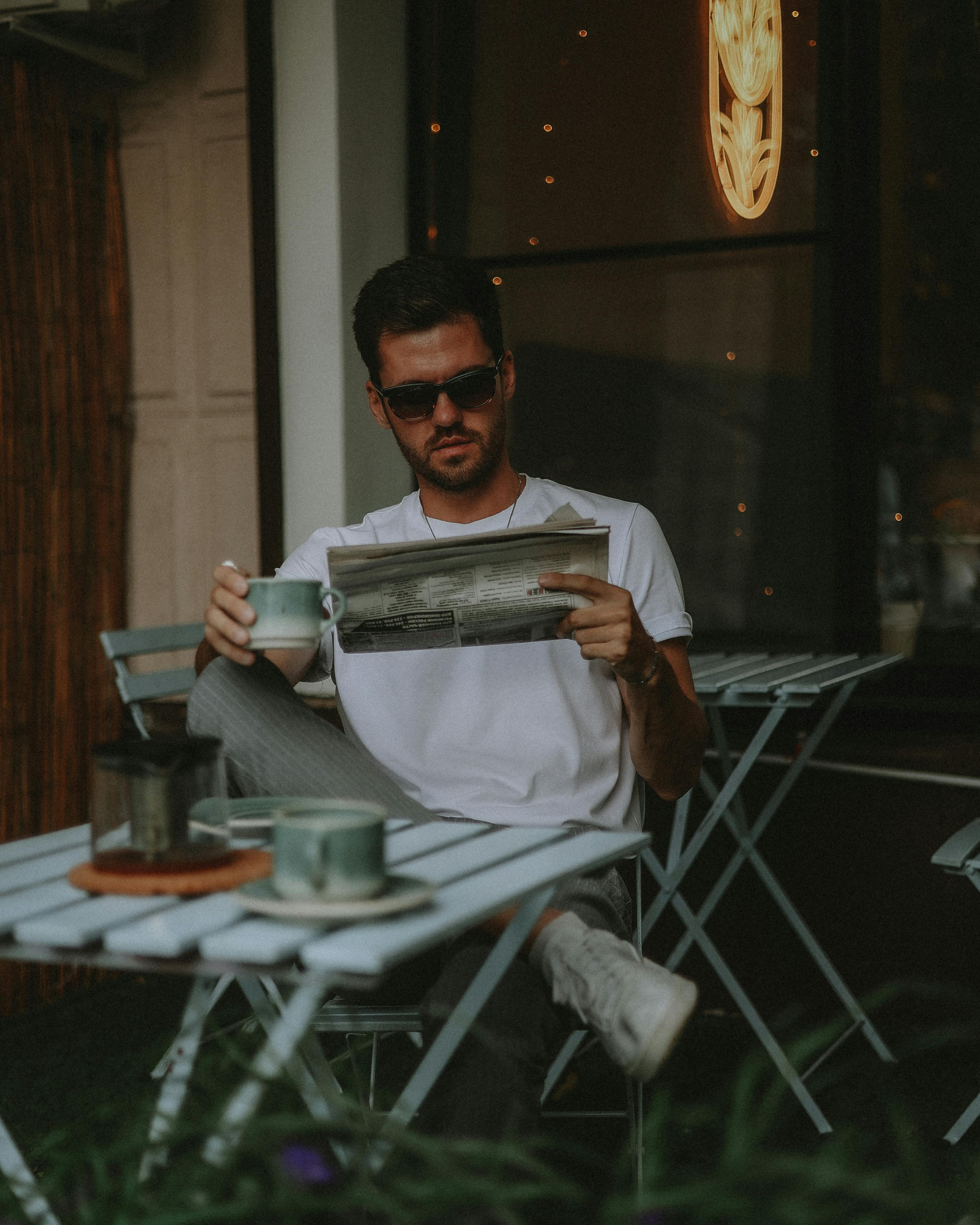 Man and Woman Sitting at the Table · Free Stock Photo