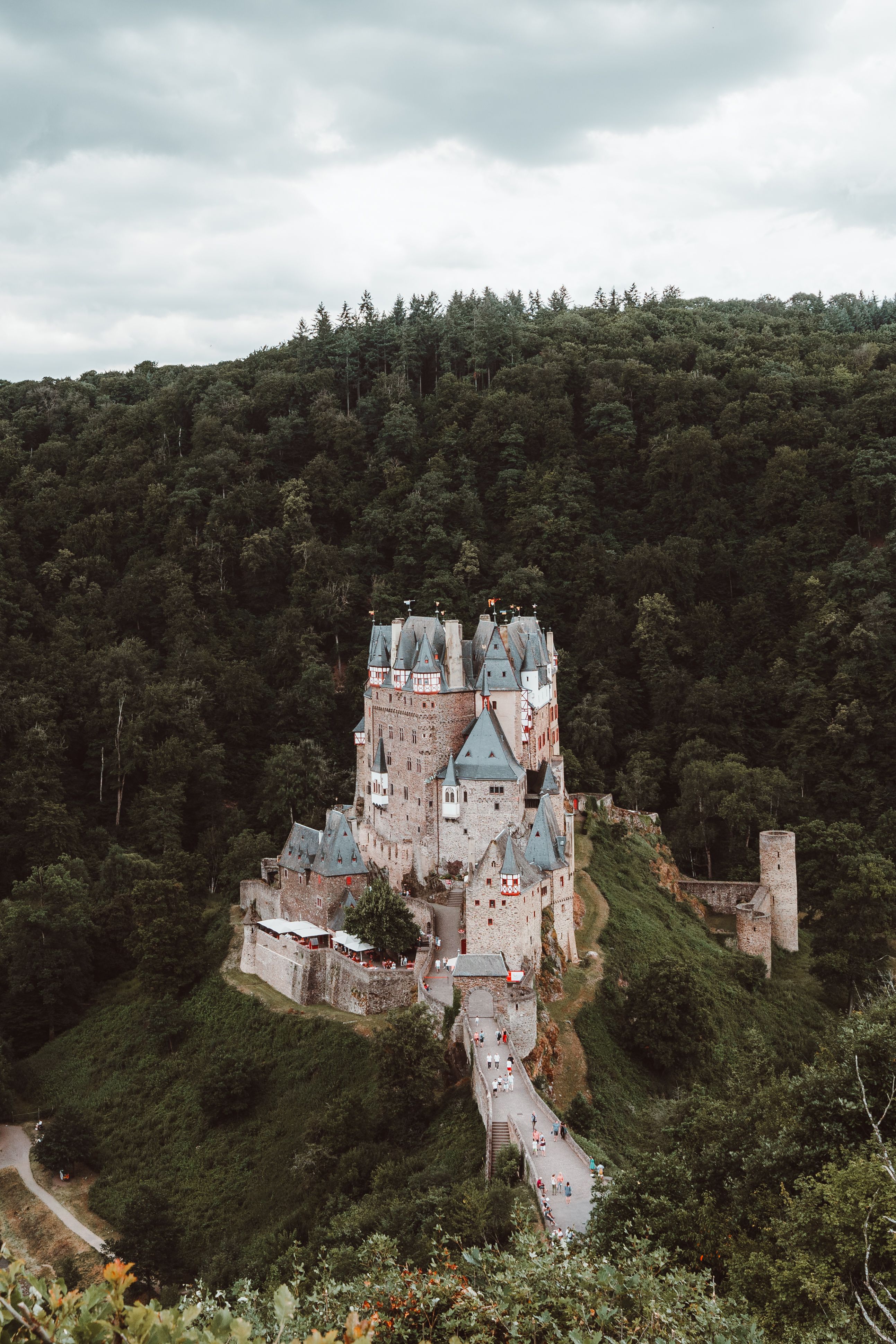 Brown Brick Castle Under Cloudy Sky · Free Stock Photo