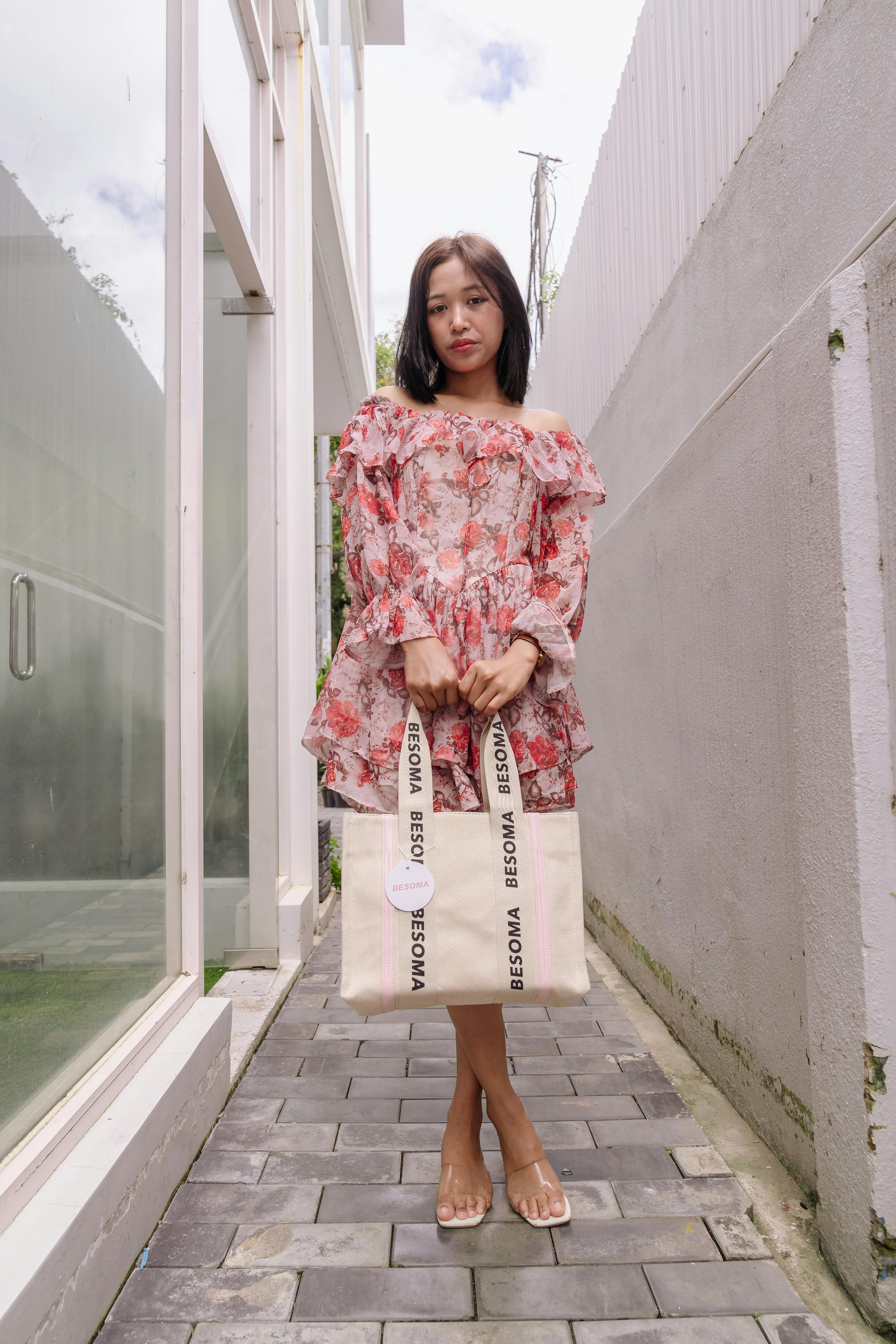 Girly bag modeling · Free Stock Photo