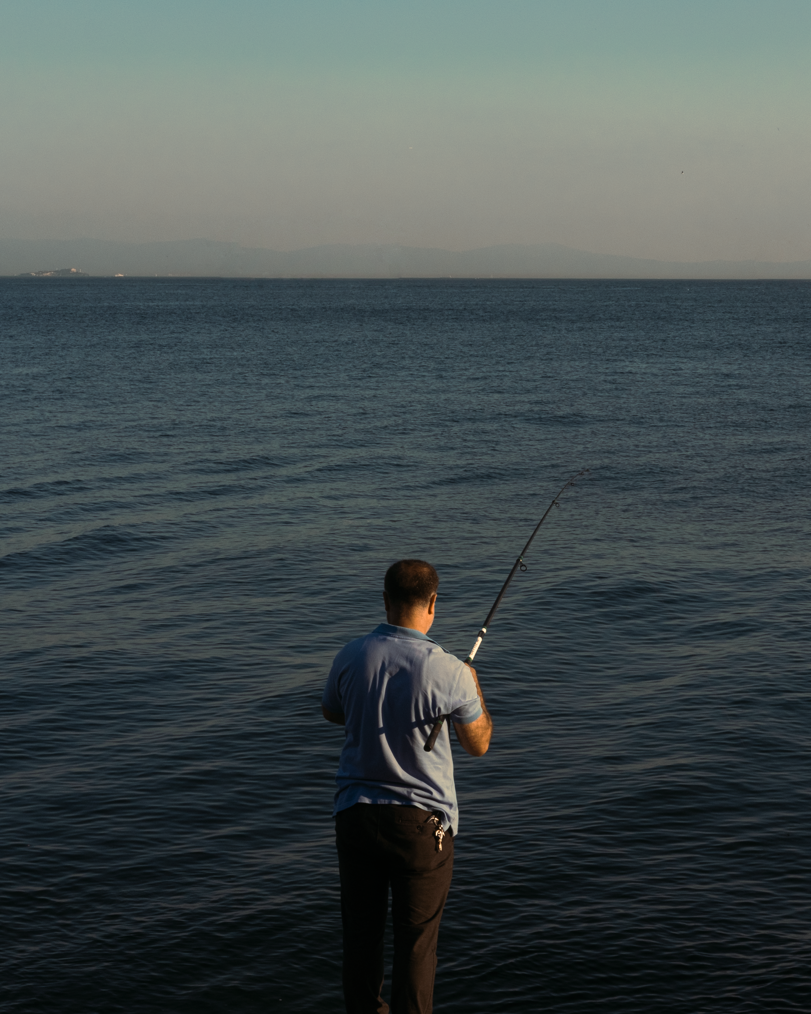 Person Fishing in the Ocean · Free Stock Photo