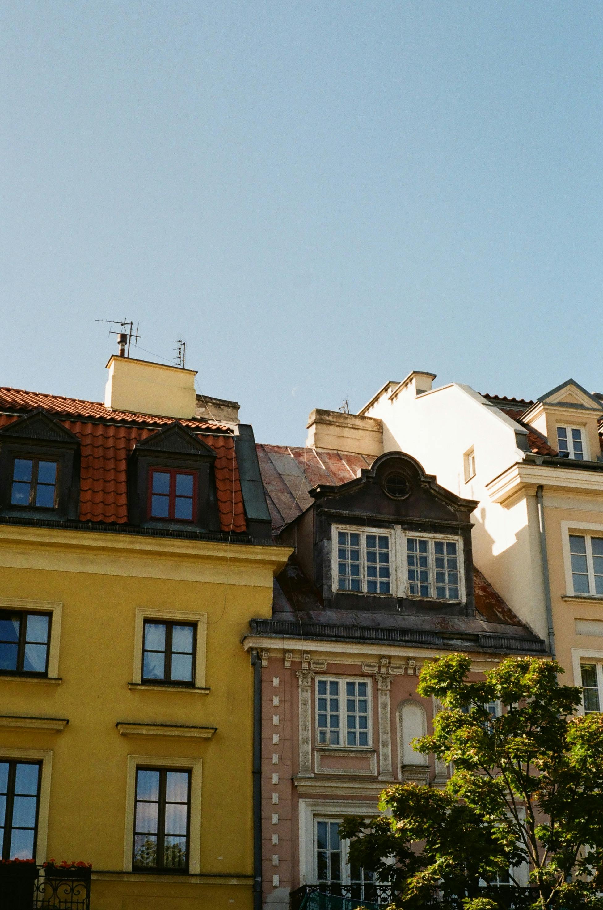 Brown Concrete Mid-rise Buildings · Free Stock Photo
