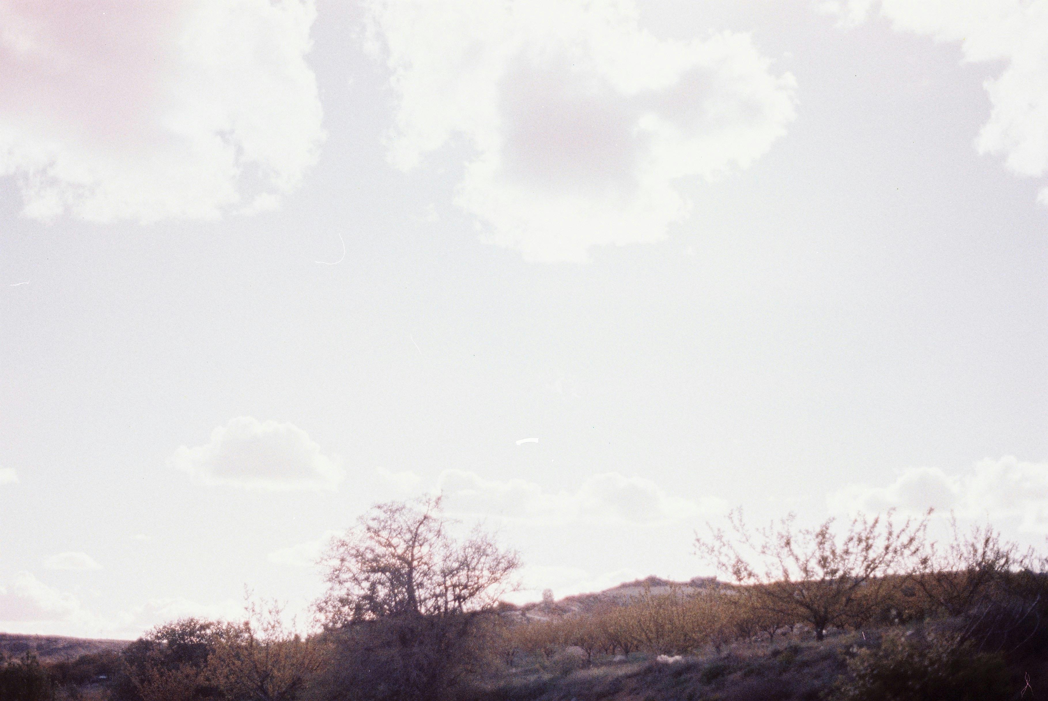 Fluffy Clouds over Autumn Landscape · Free Stock Photo