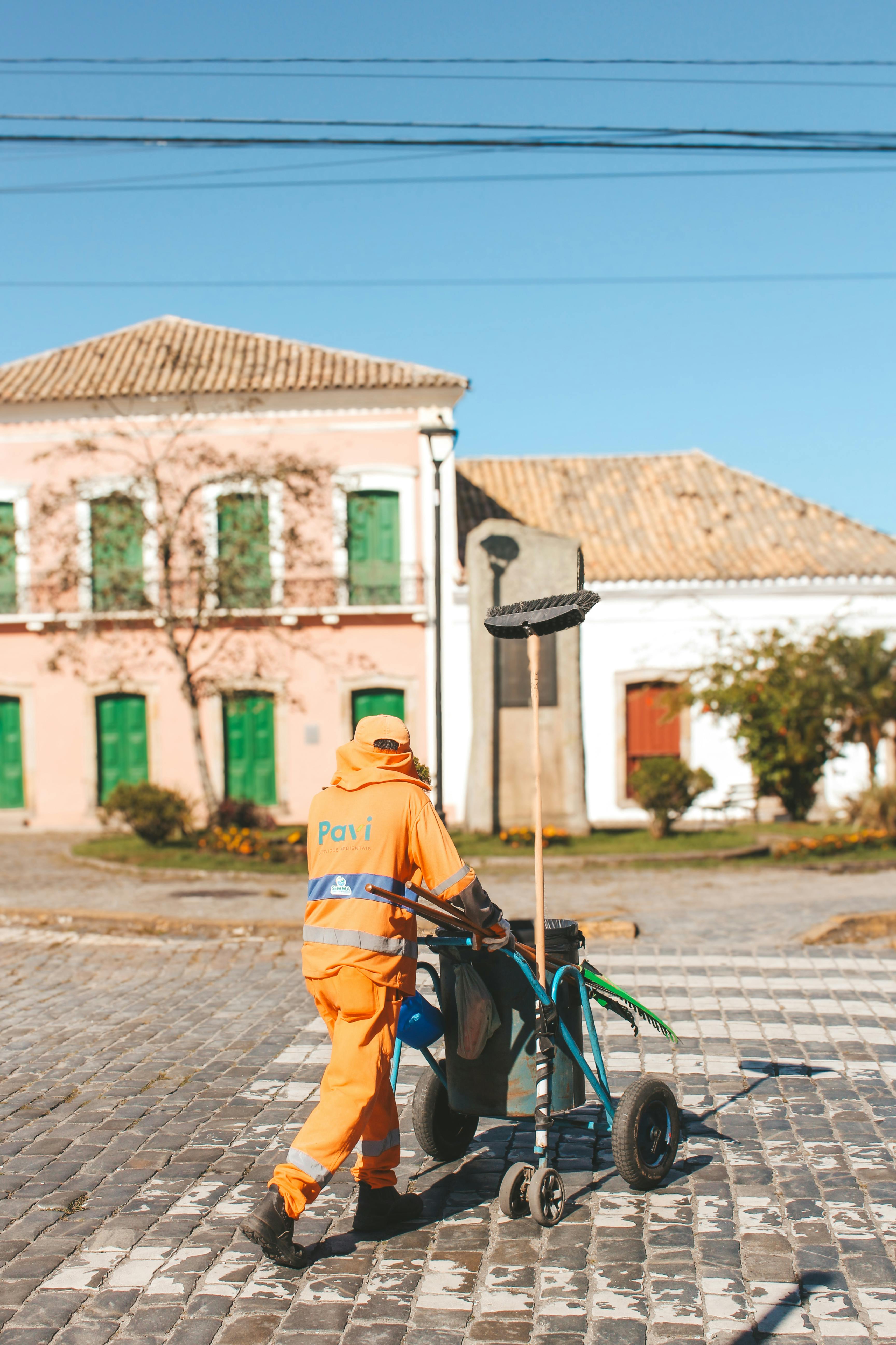 Garbage Man on Crosswalk · Free Stock Photo