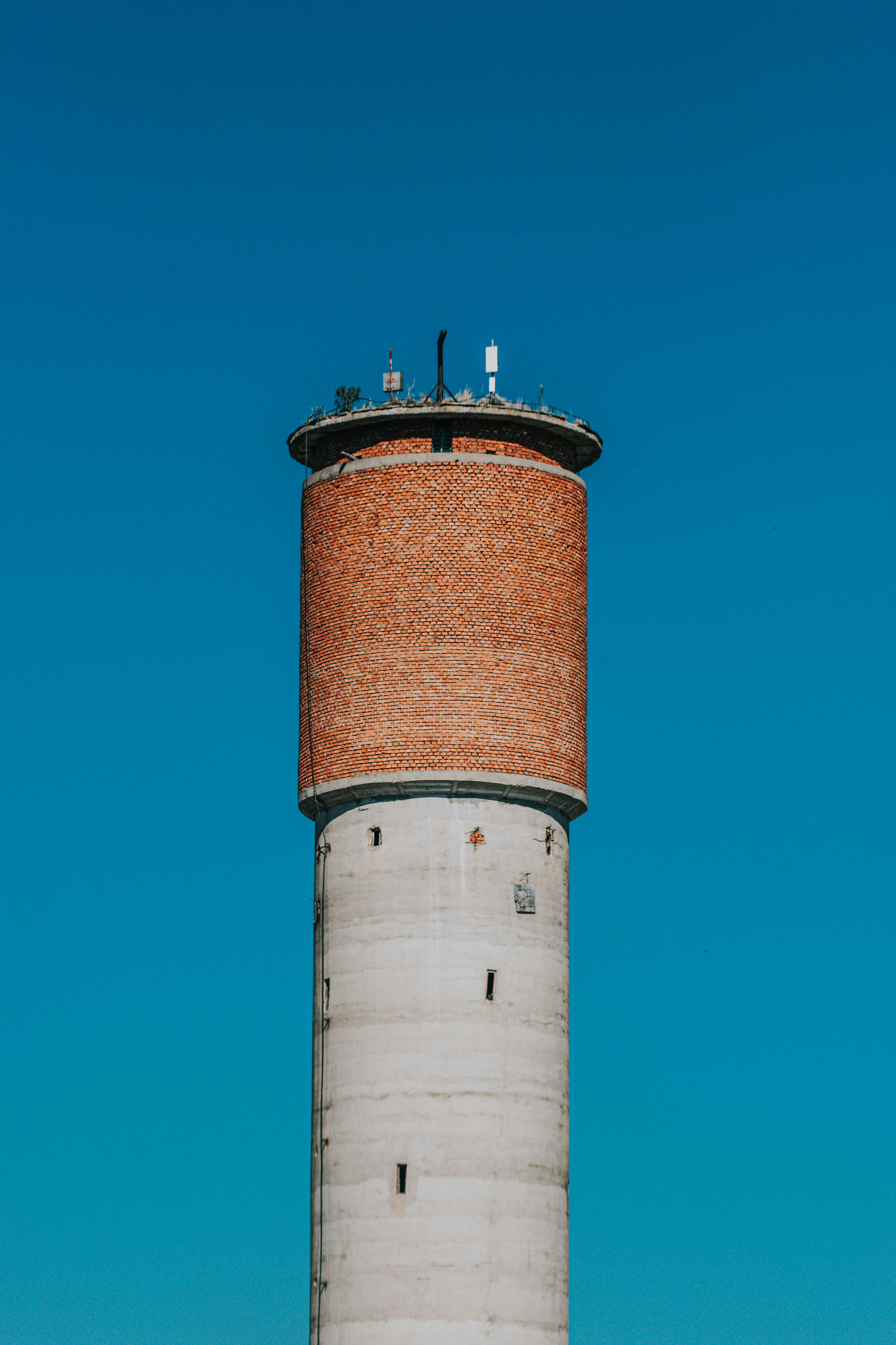 Cement and Brick Water Tower · Free Stock Photo