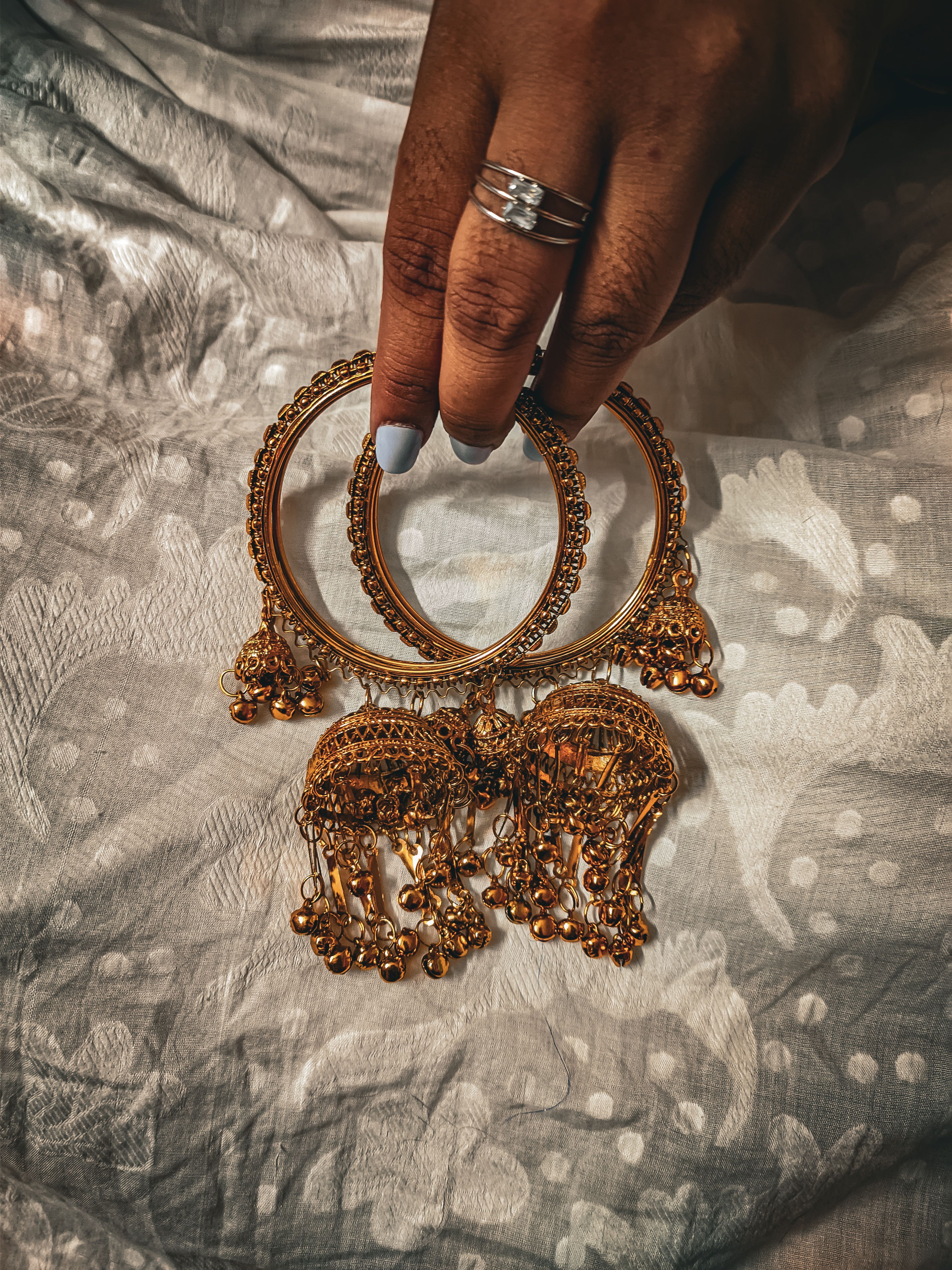 Precious Golden Earrings · Free Stock Photo