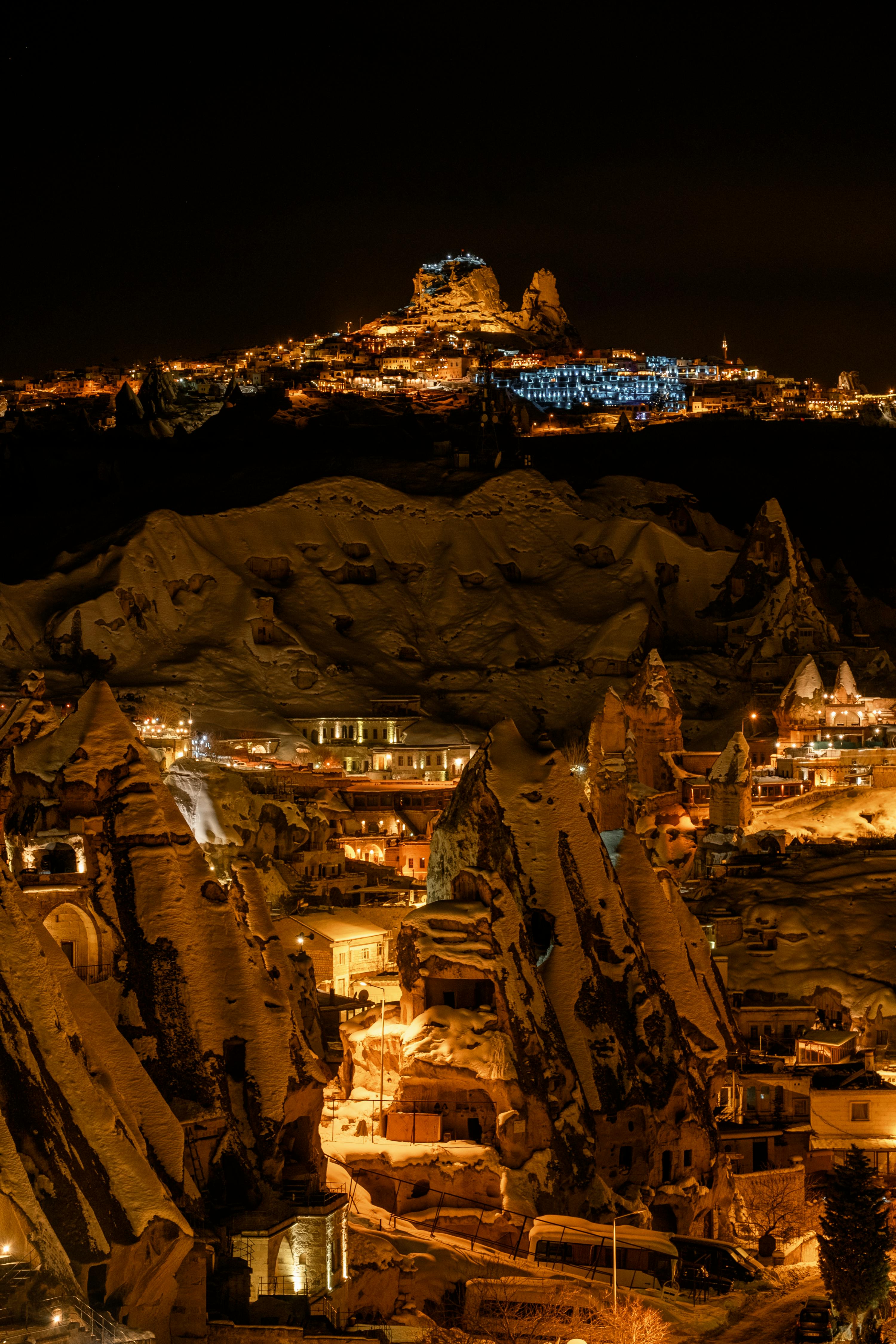 Town among Rock Formations in Cappadocia at Night · Free Stock Photo