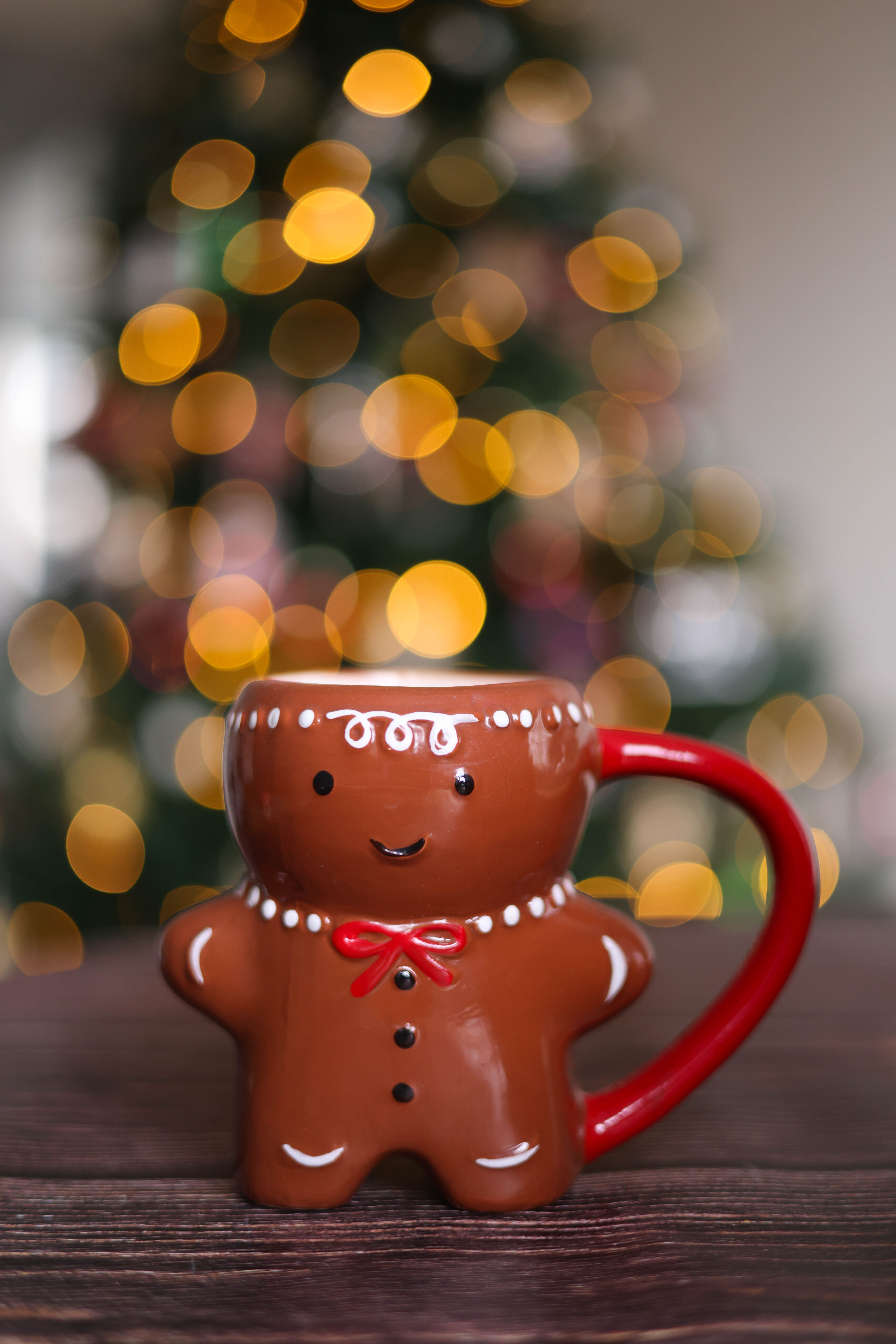 Christmas Mug in Shape of a Gingerbread Man on a Table · Free Stock Photo