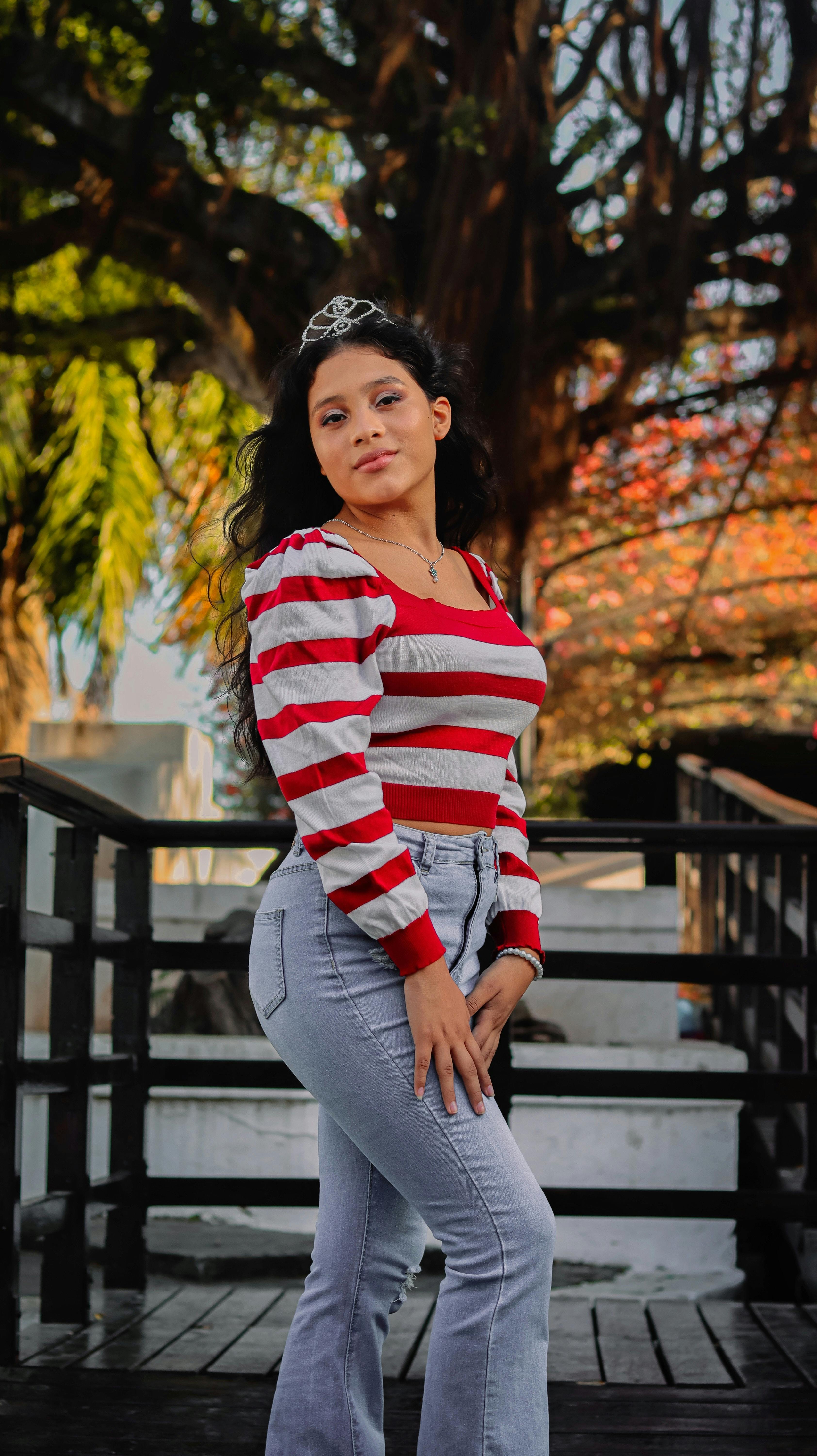 Young Woman in a Casual Outfit and a Tiara Standing Outside · Free ...