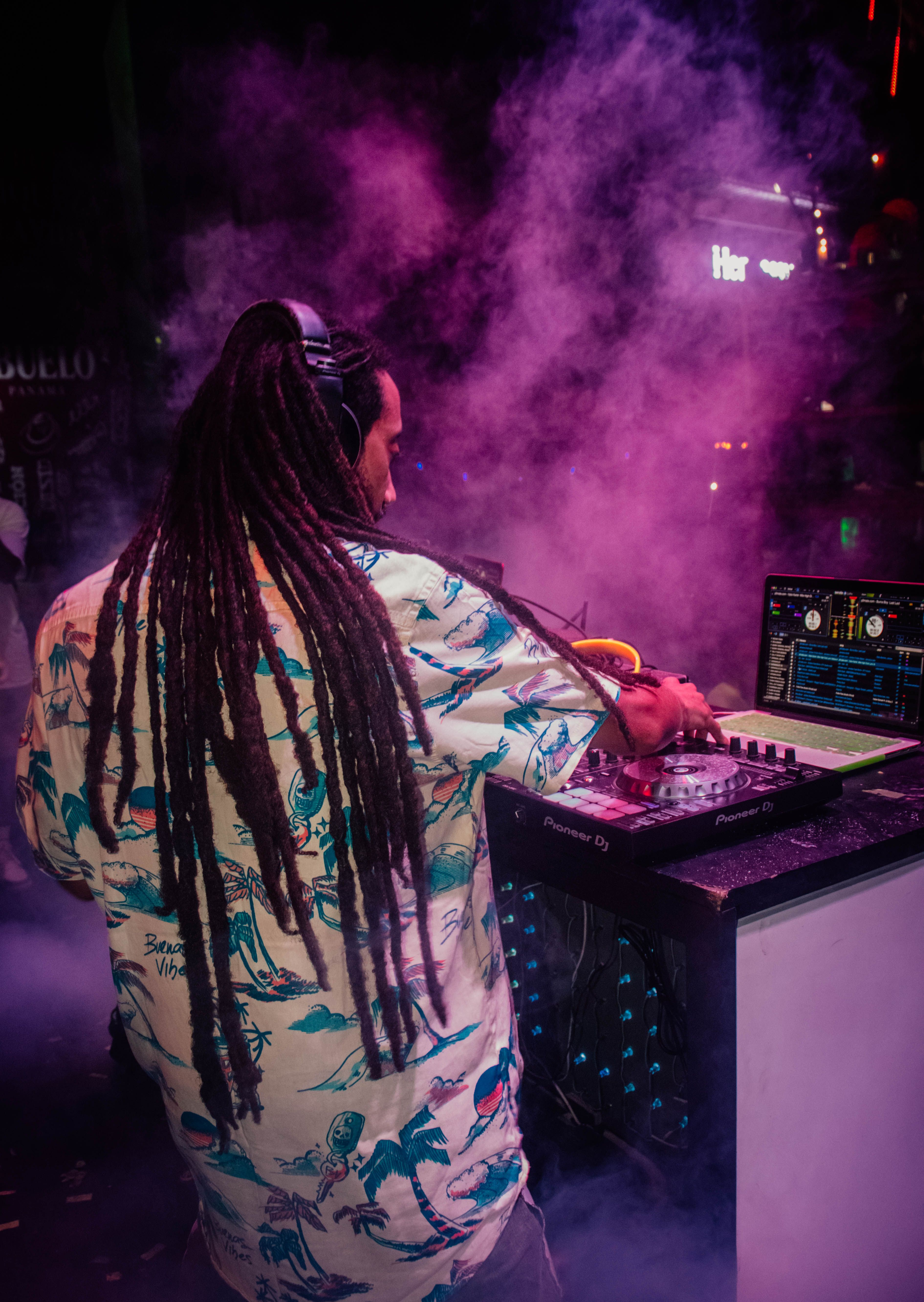 DJ Working in Nightclub · Free Stock Photo