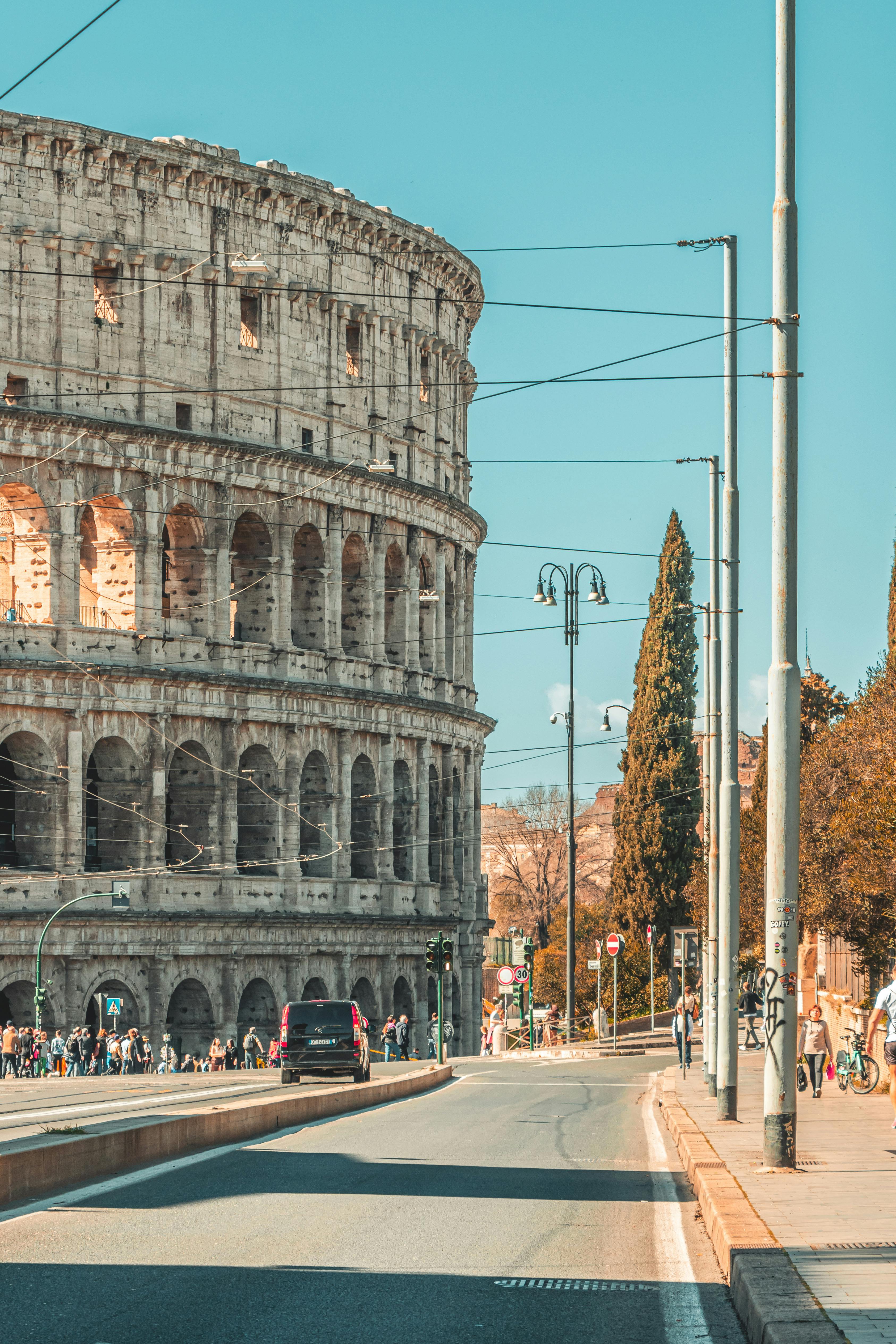 Tram Overhead Lines if Front of Colosseum in Rome · Free Stock Photo