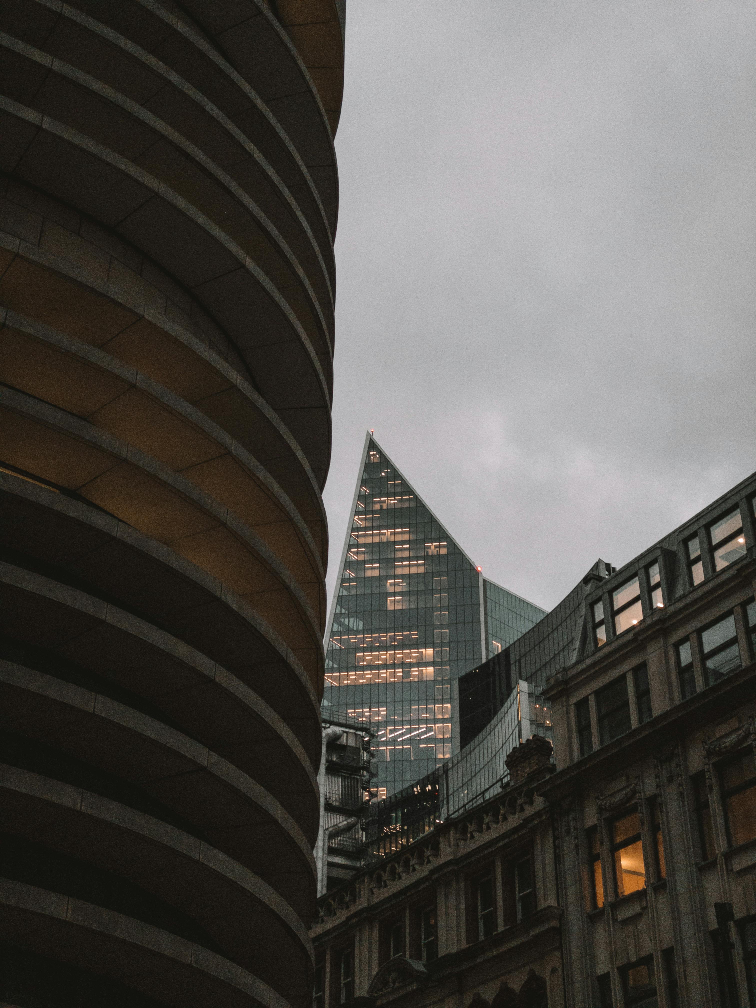Skyscraper behind Buildings in City · Free Stock Photo