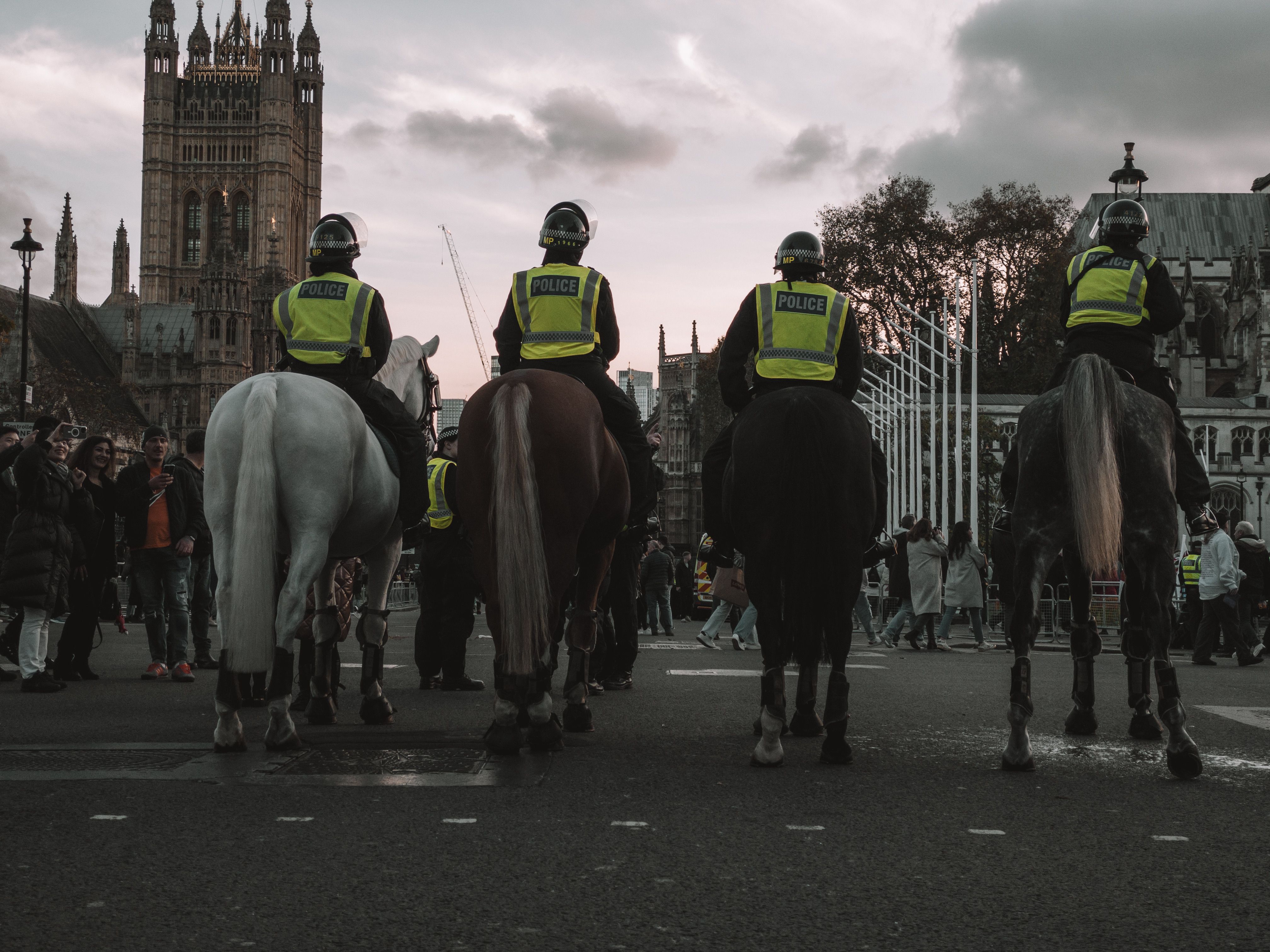 Police Officers on Horseback Guarding the Streets of London in Front of ...