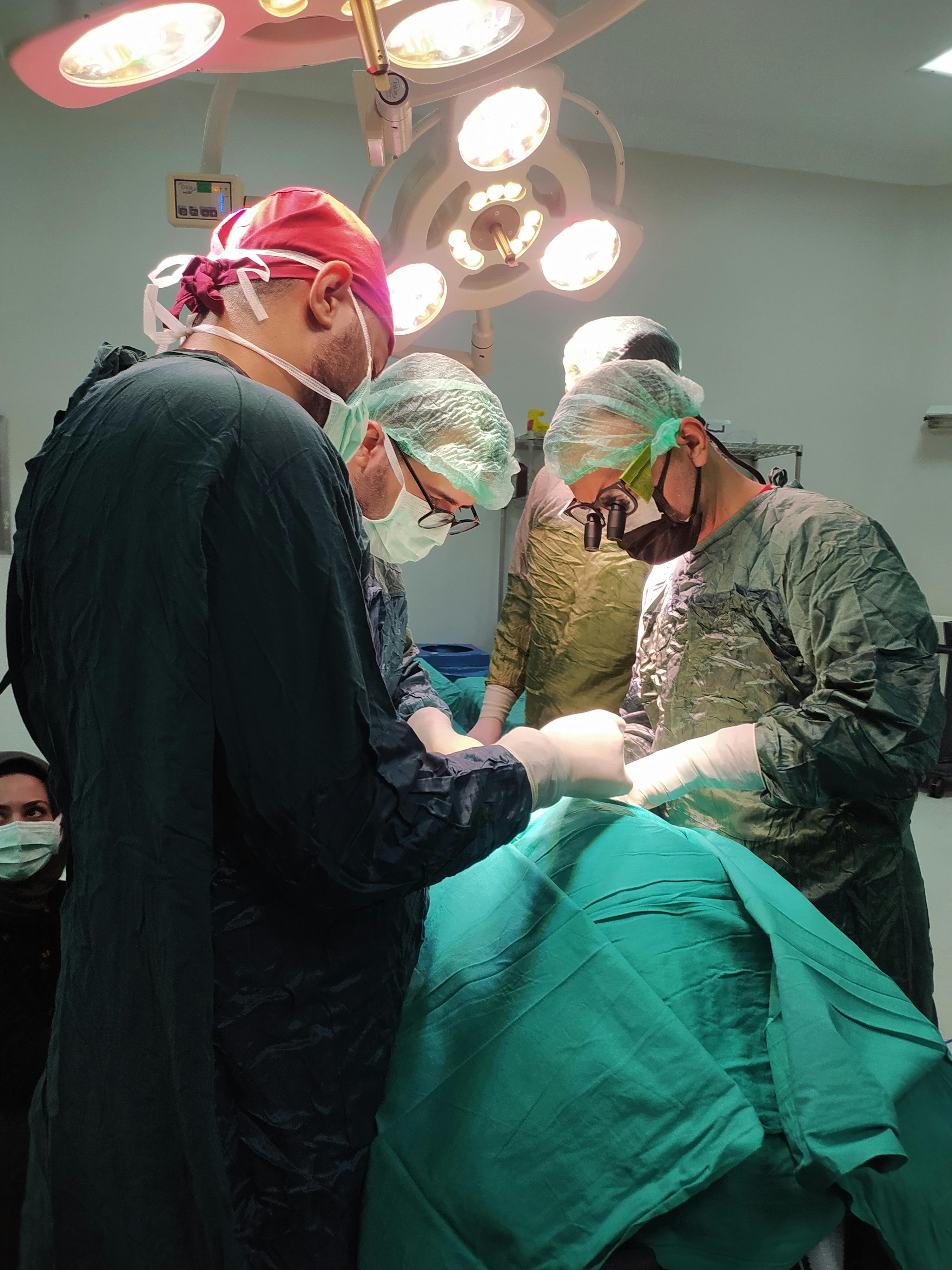 Surgeons in an Operating Room · Free Stock Photo