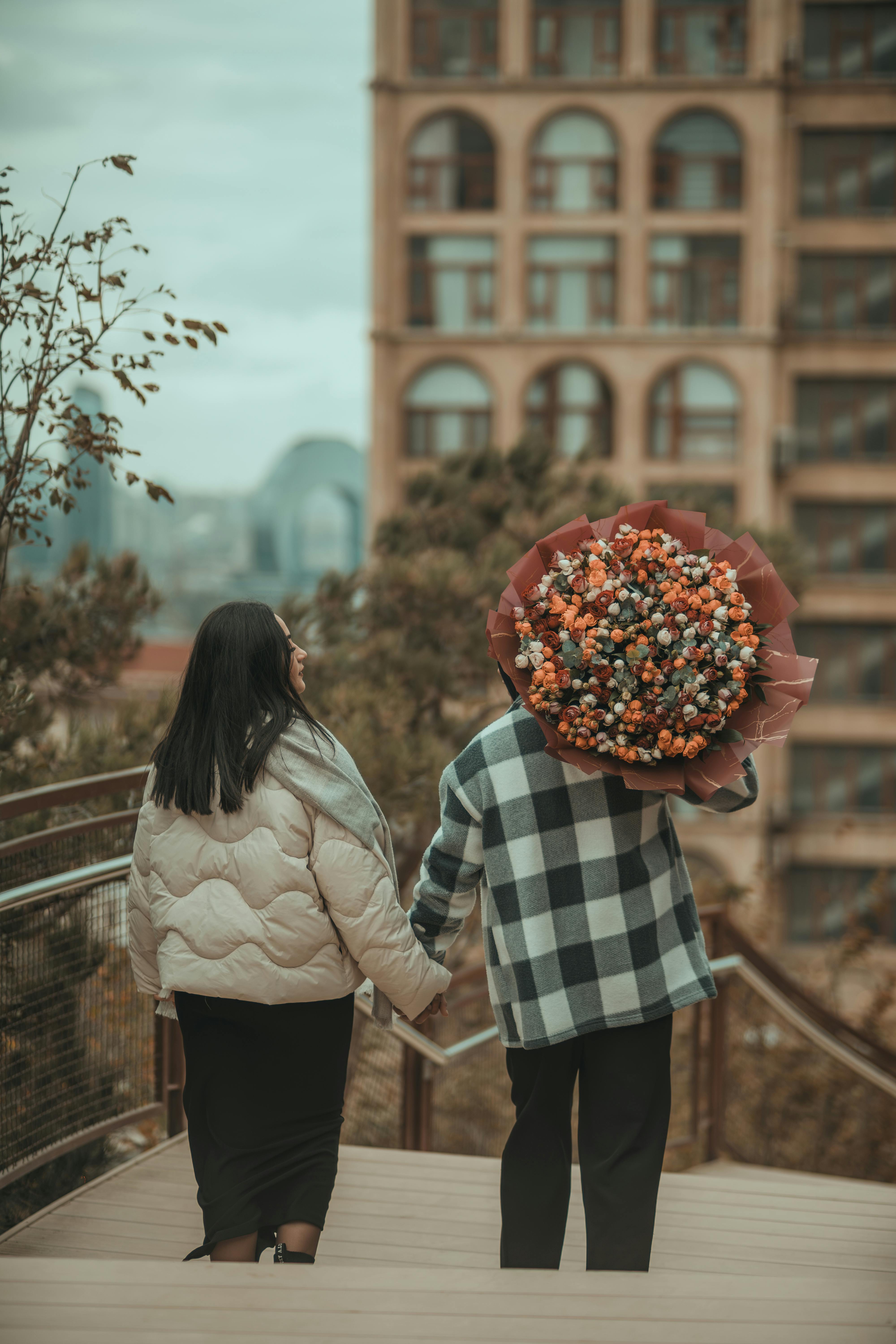 Back View of Two People Walking towards Lake · Free Stock Photo