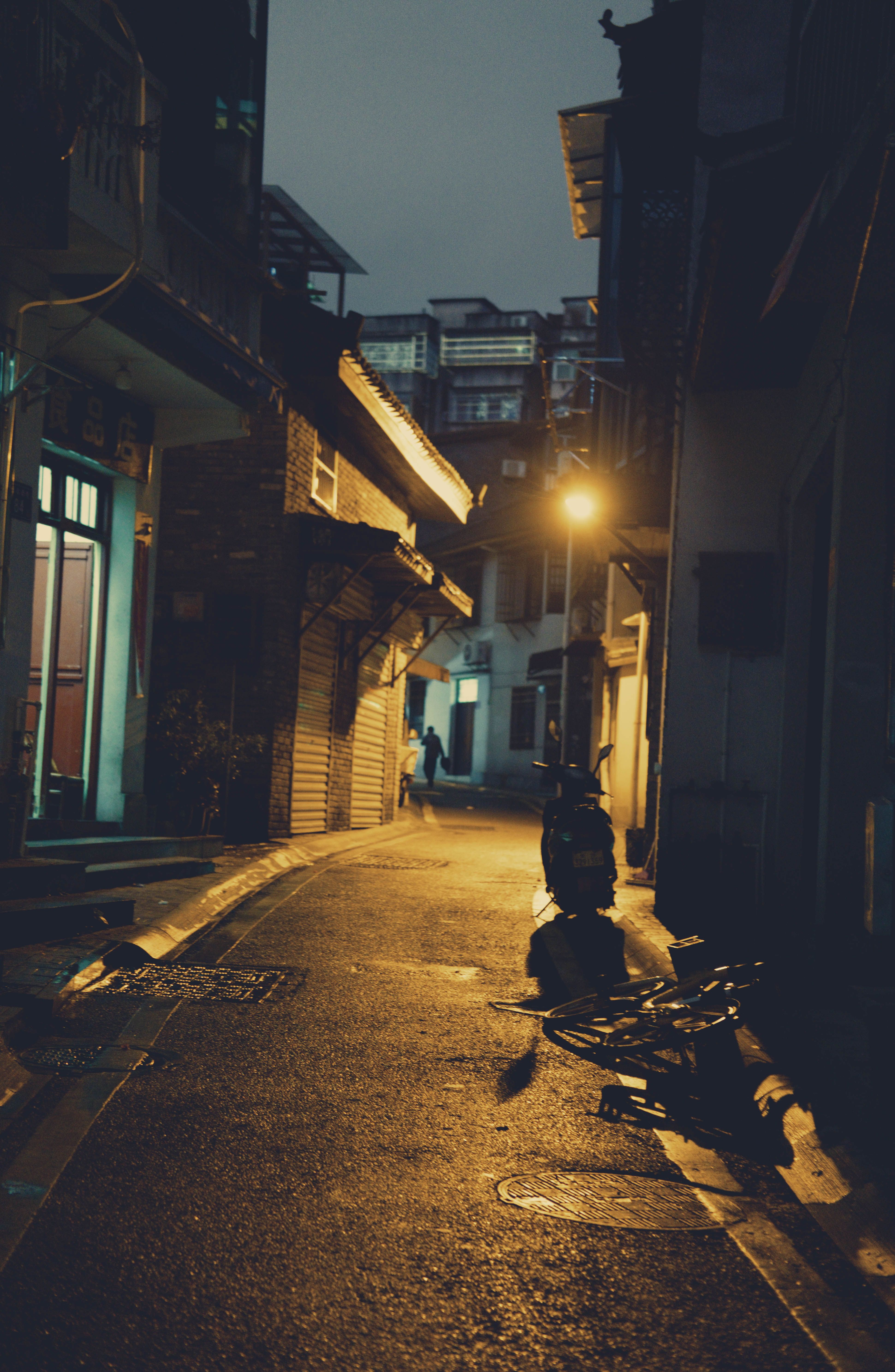Streetlamp in Narrow Alley at Night · Free Stock Photo