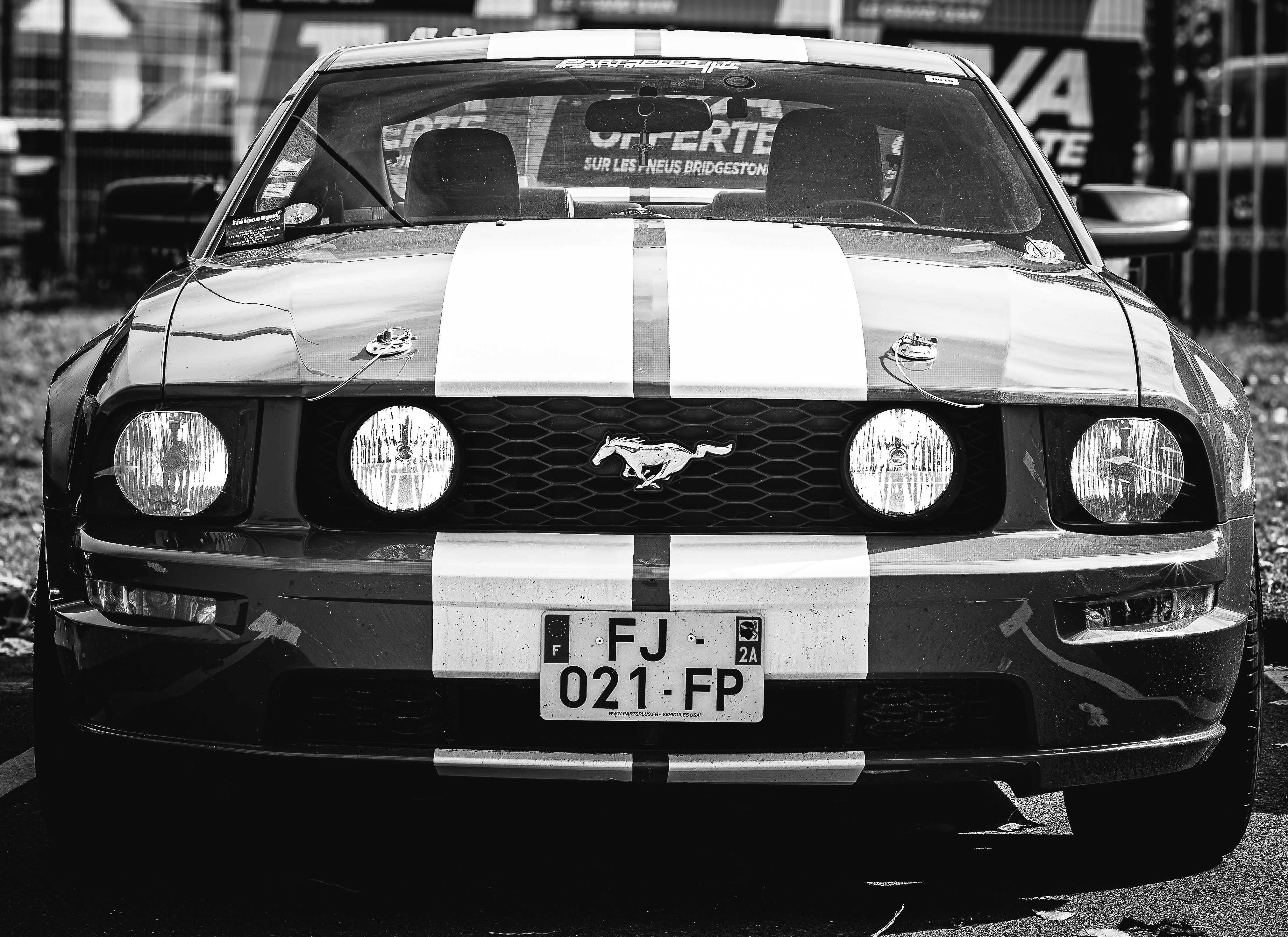 Monochrome Shot of a Ford Mustang · Free Stock Photo