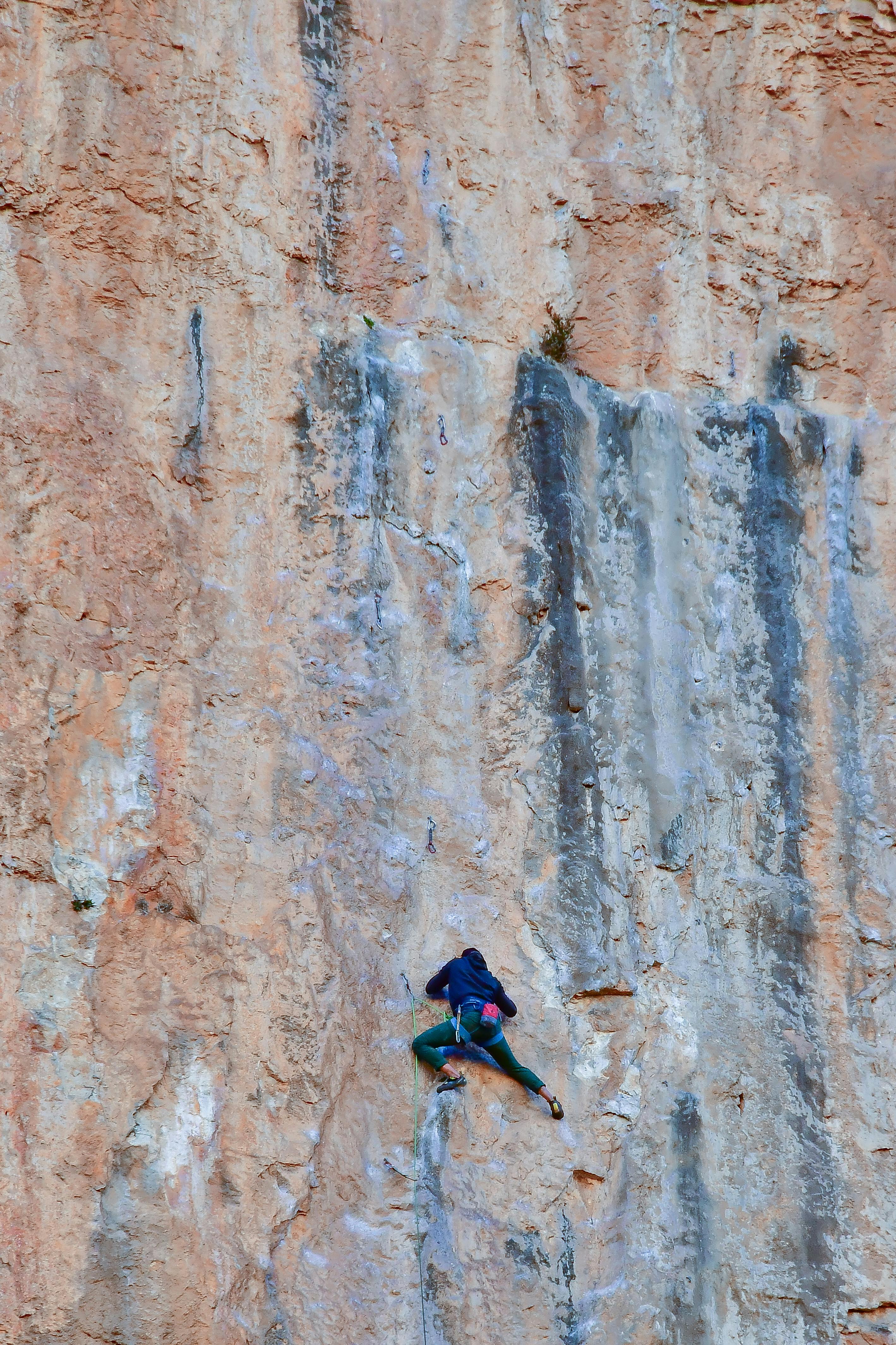 Silhouette of Men Rock Climbing in the Gap between Two Cliffs · Free ...