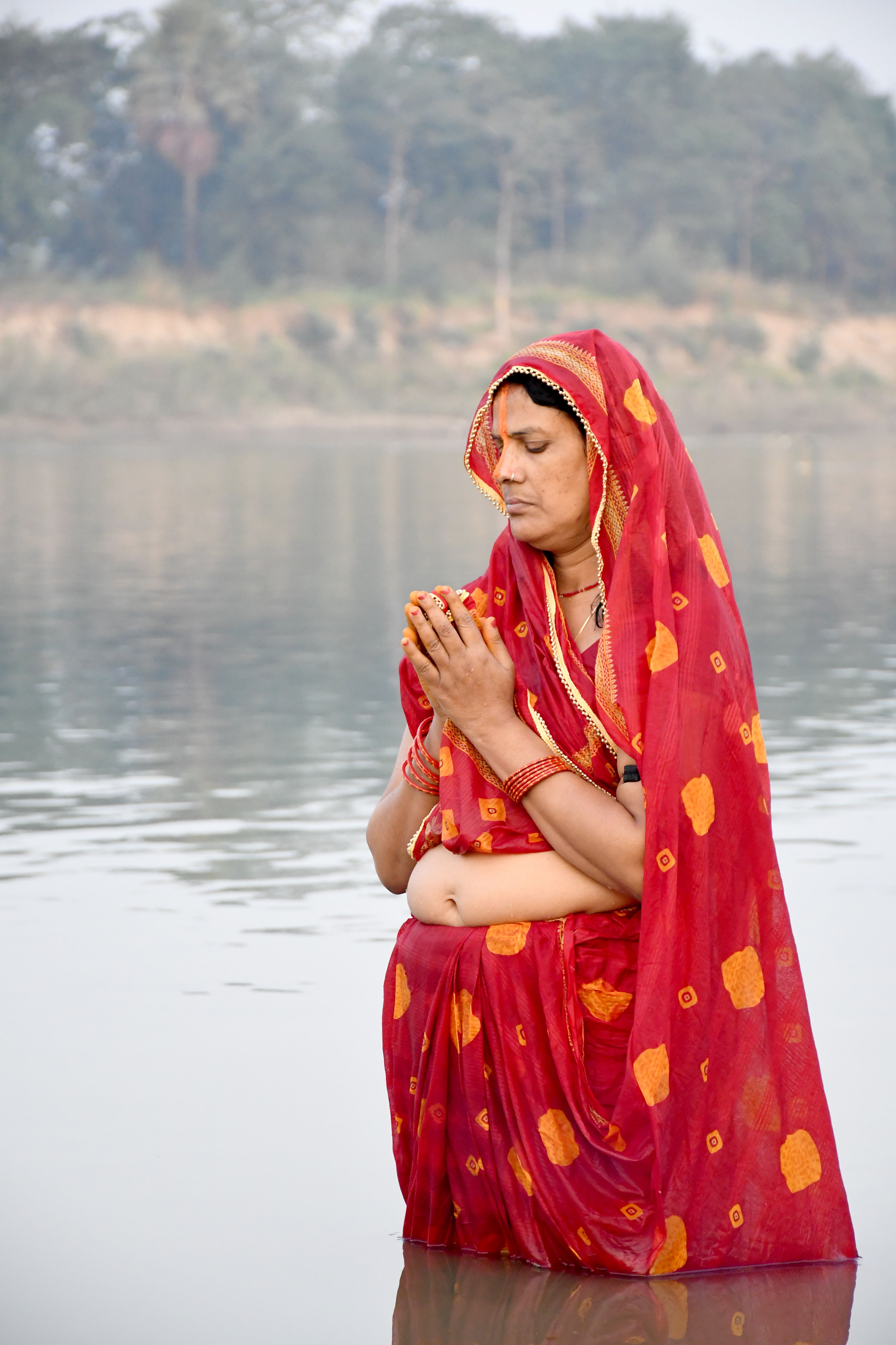 Women in Traditional Dresses Lighting Candles at Ceremony · Free Stock ...