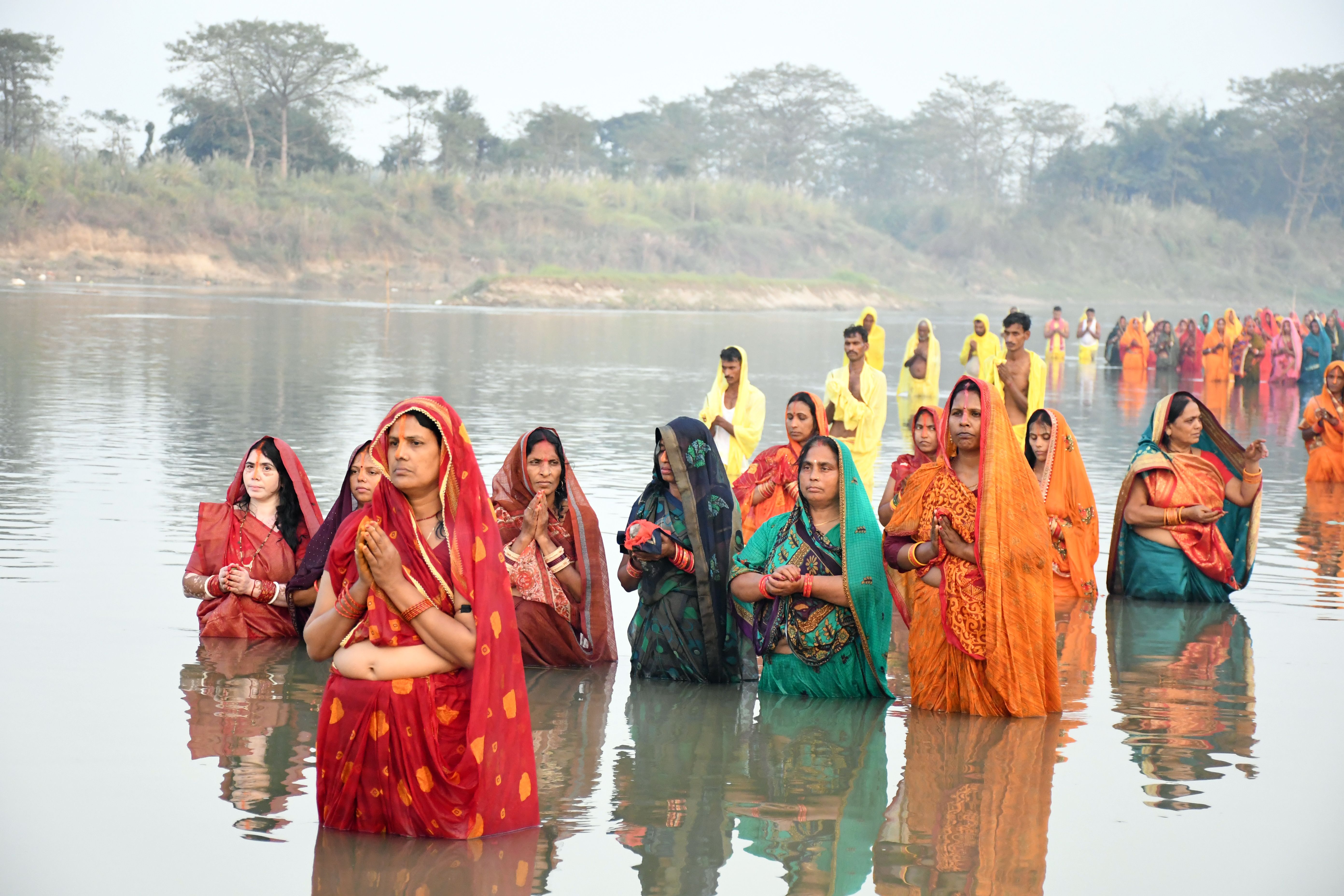 People Praying in River · Free Stock Photo