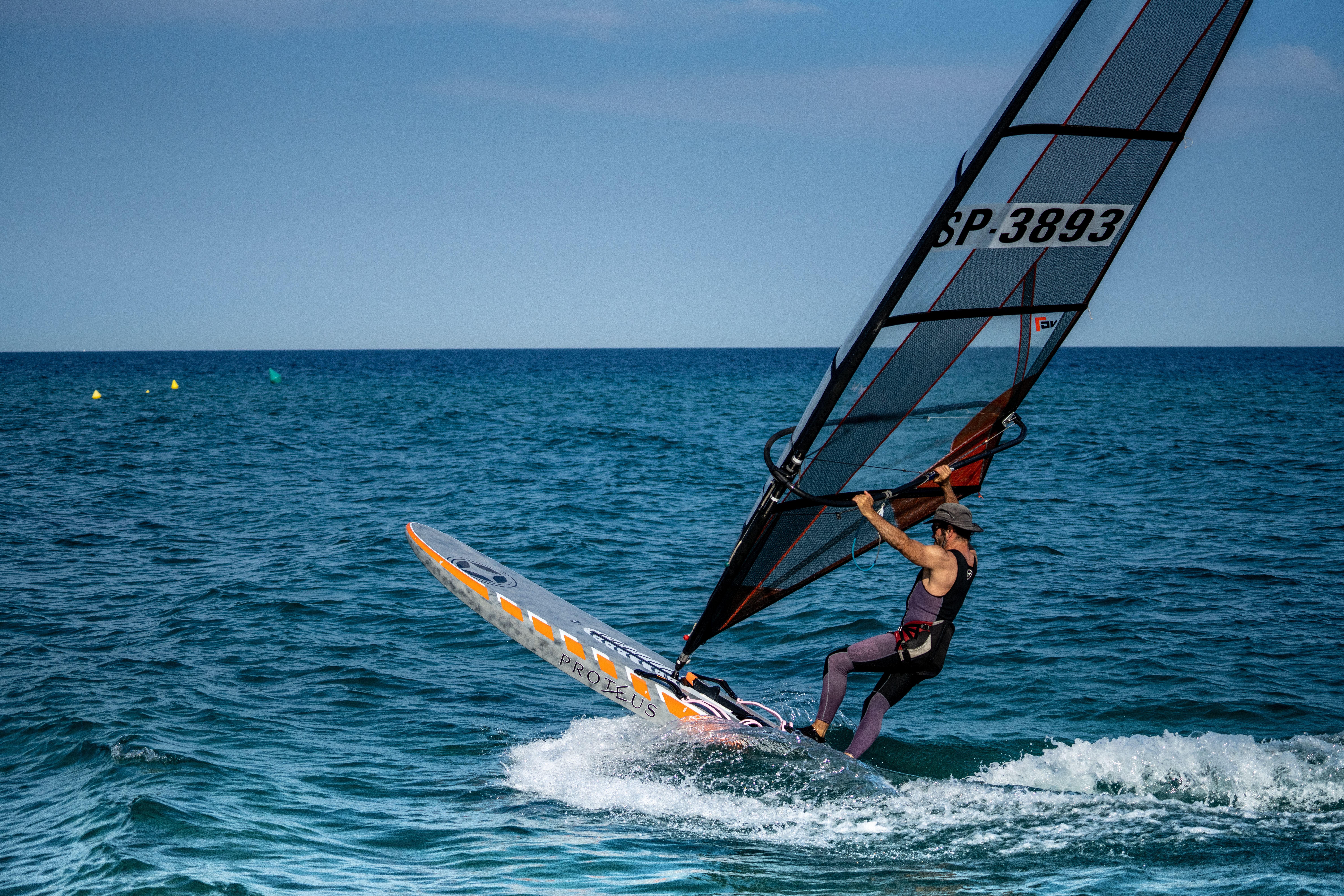 Photo of a Man Windsurfing · Free Stock Photo