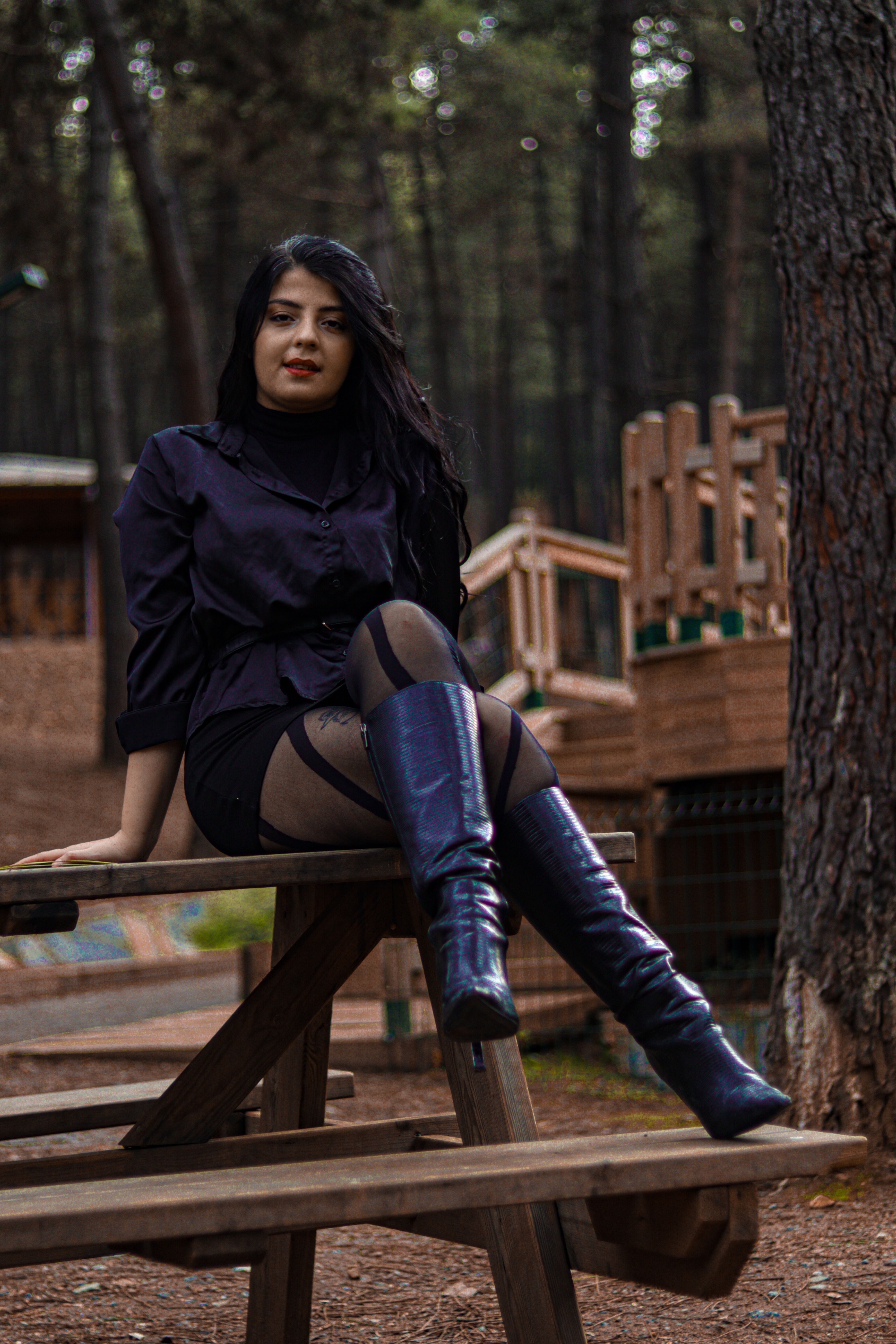 Brunette in Green Blazer Mini and Black Boots · Free Stock Photo