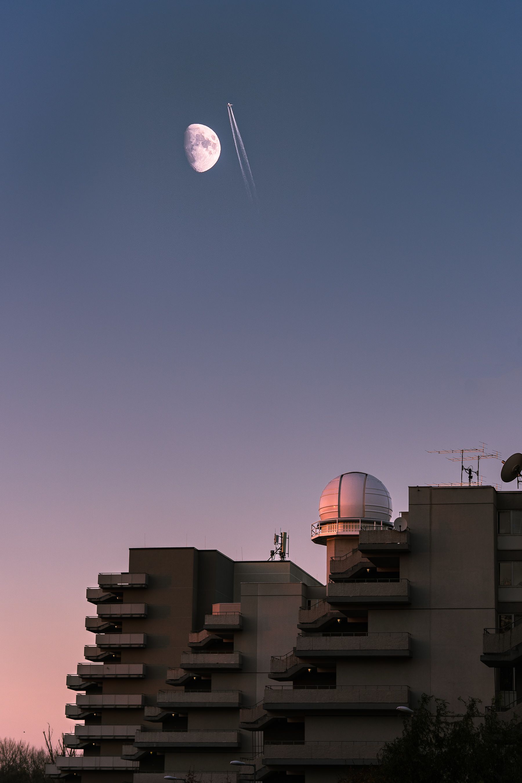 Moon and Clear Sky over Buildings in Town at Dusk · Free Stock Photo