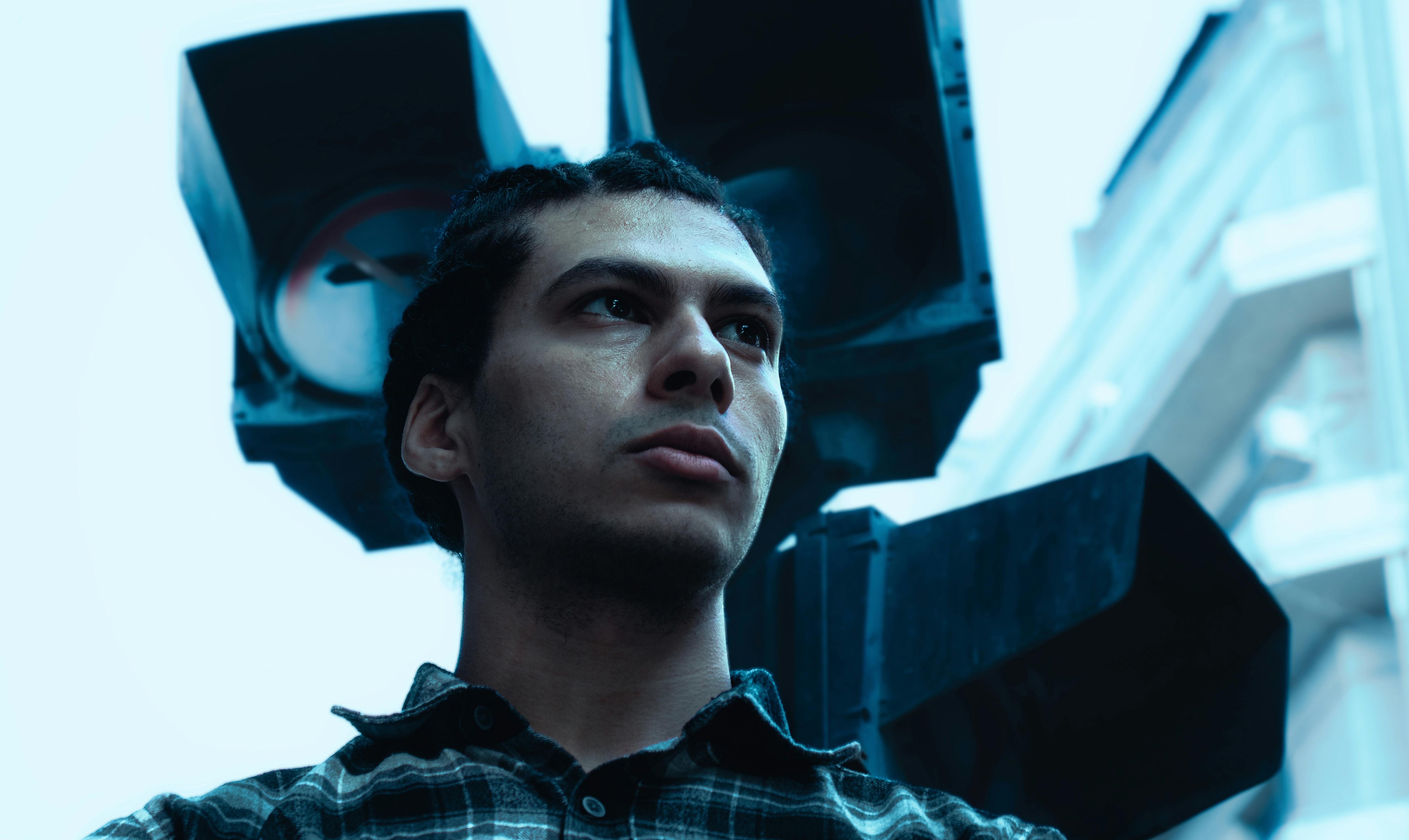 Street Light behind Man · Free Stock Photo