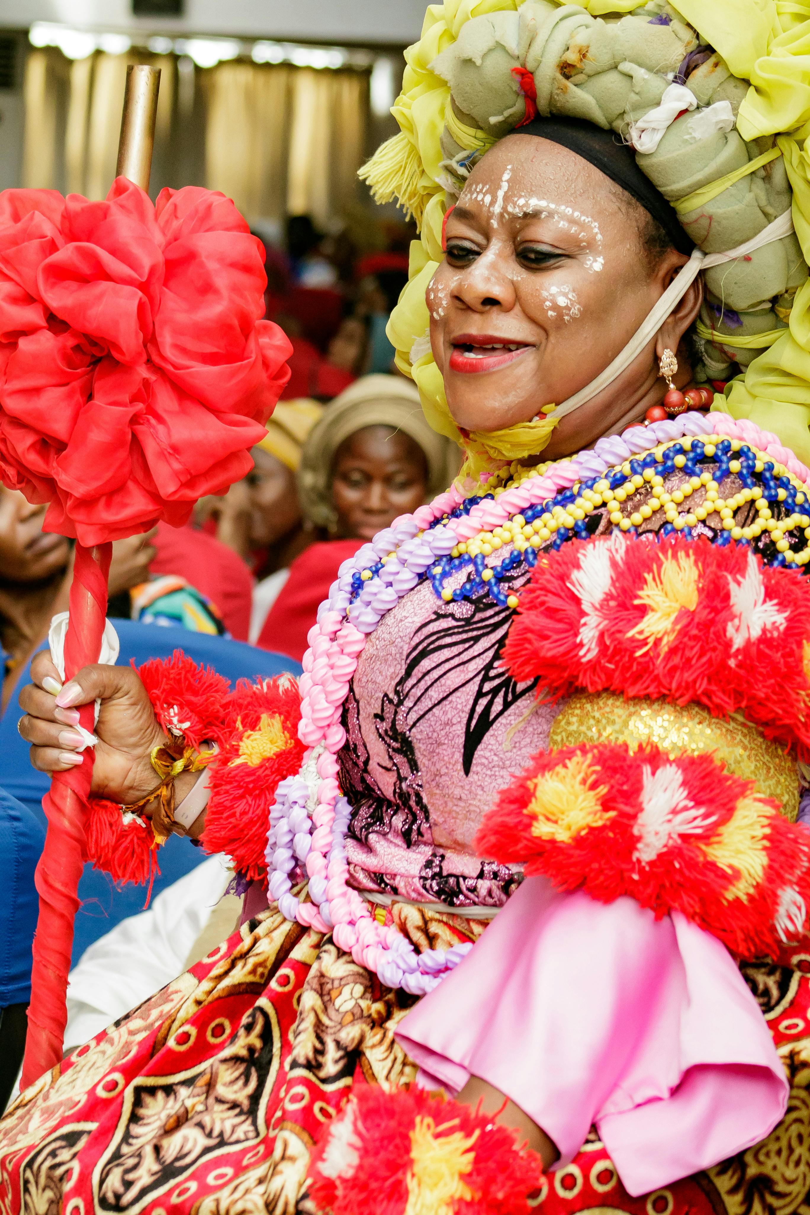 African Man Holding Snake in Traditional Dress · Free Stock Photo
