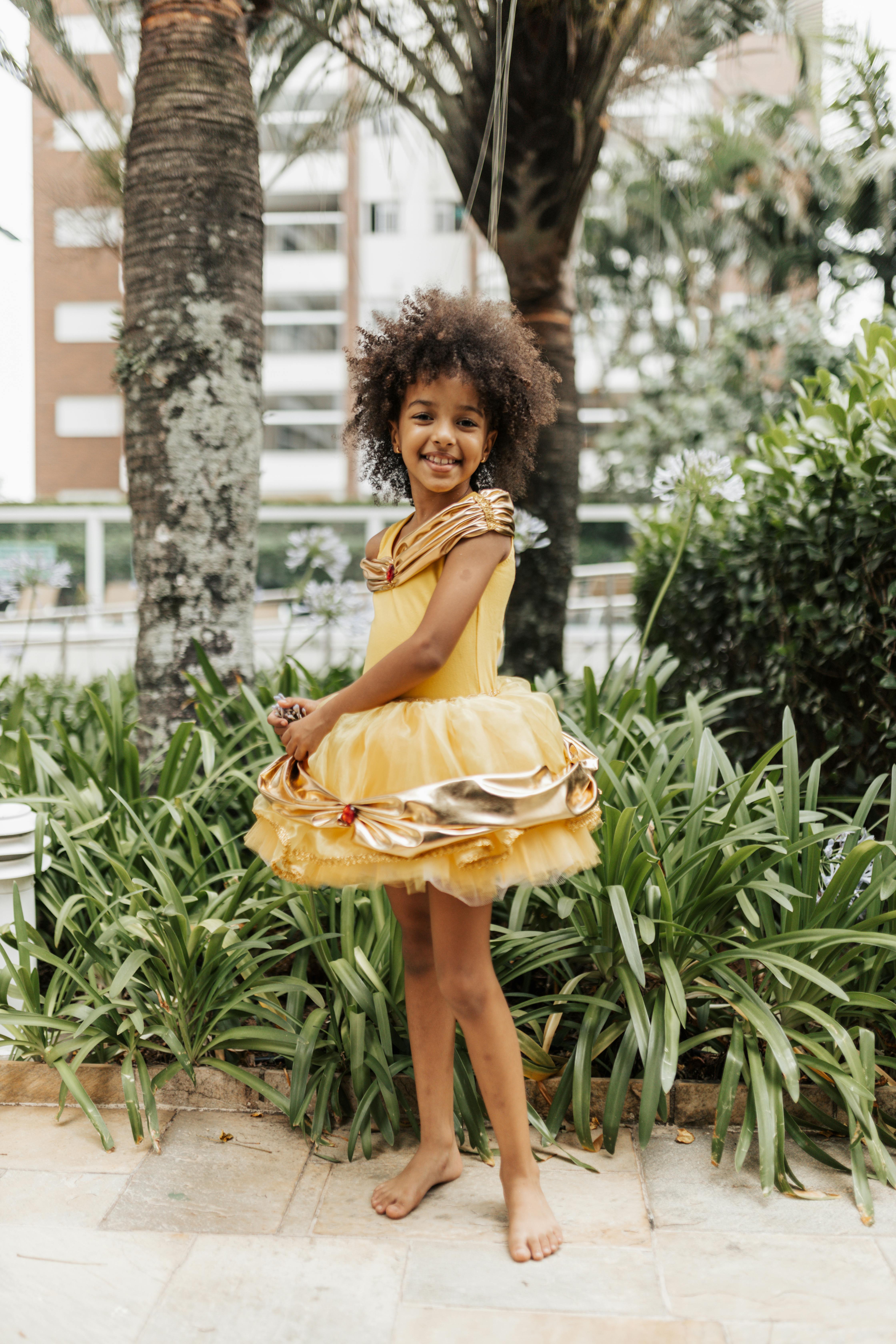 Child Model in Gold Dress · Free Stock Photo