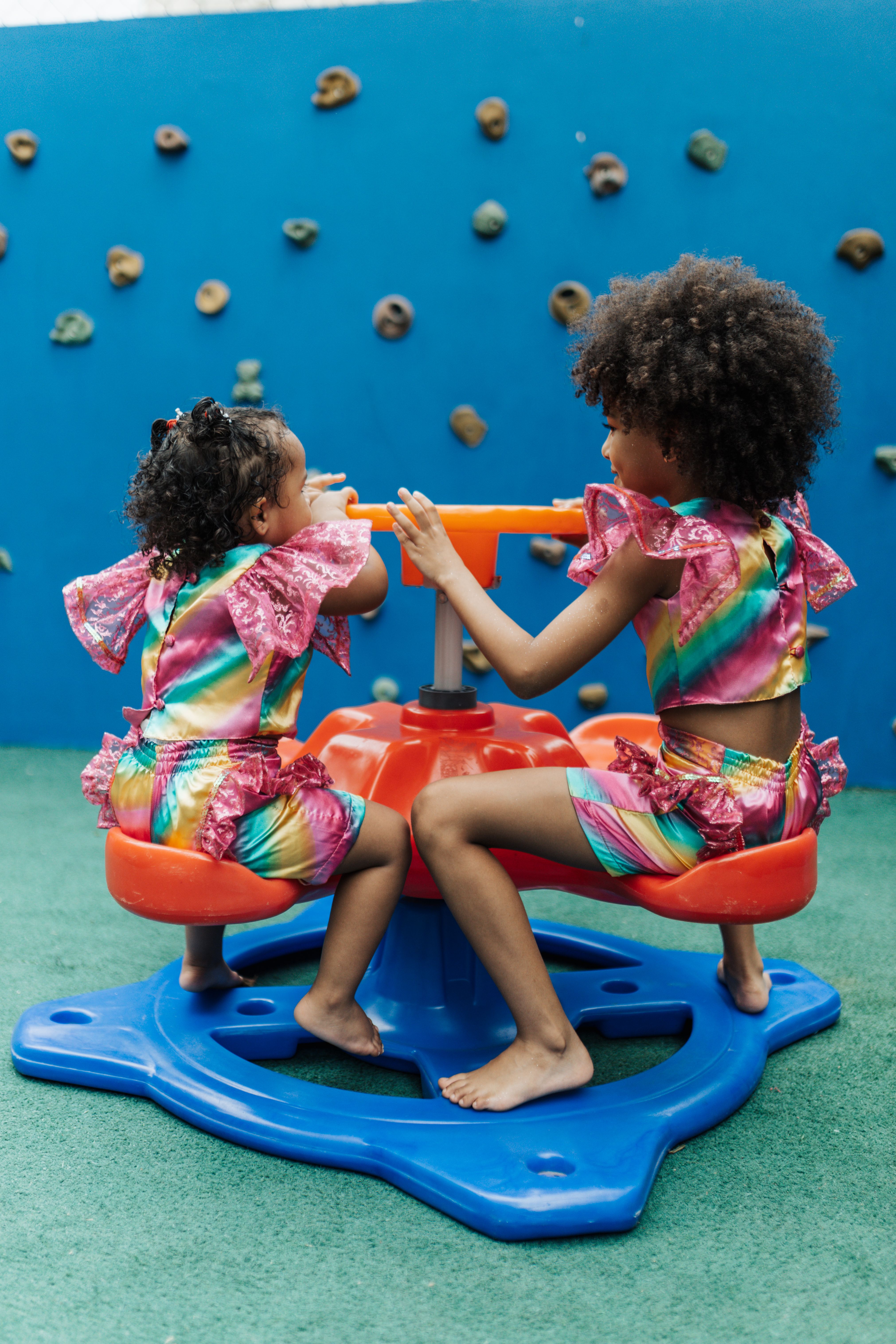 Girls in Colorful Costumes at Playground · Free Stock Photo