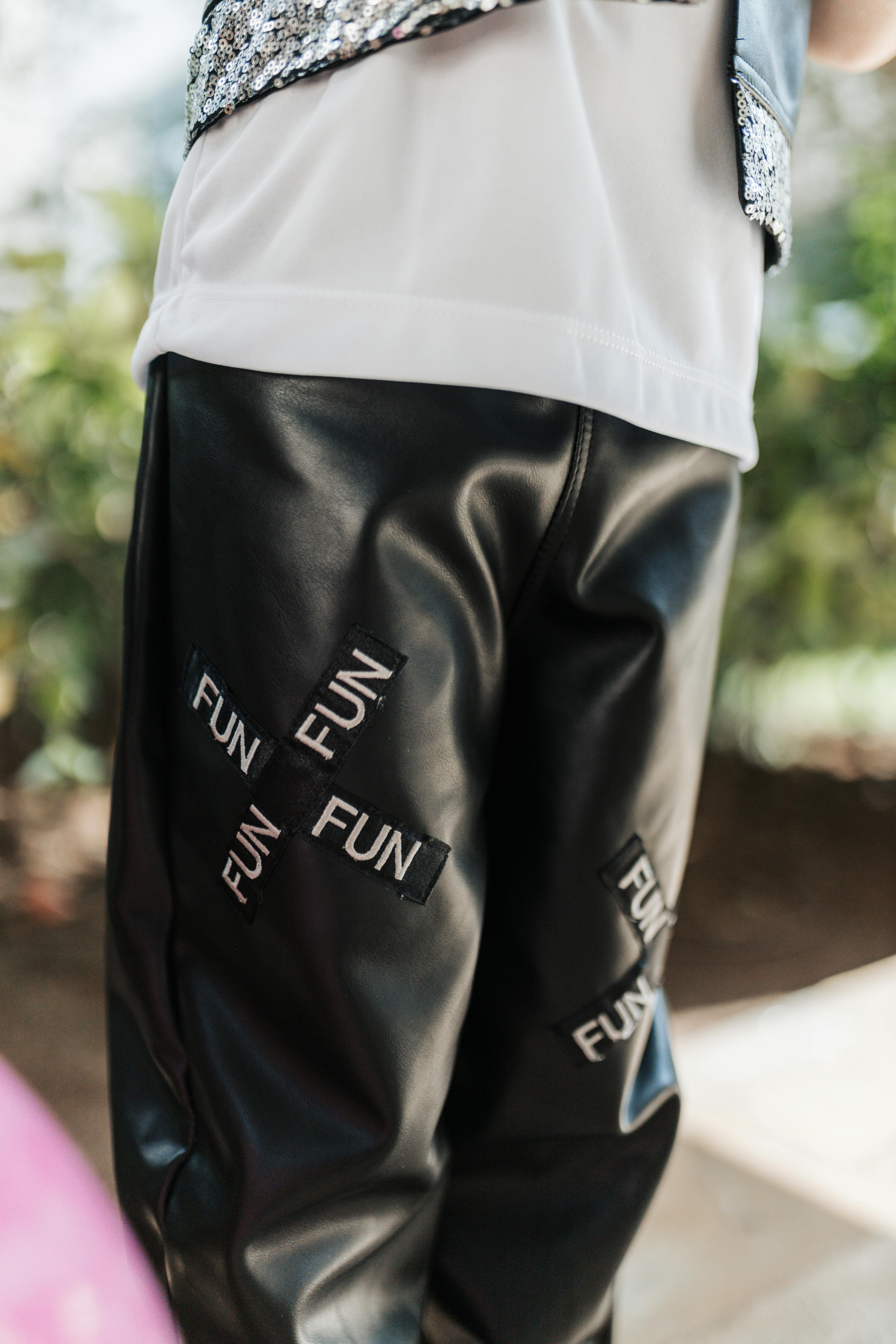 Child Model in Leather Pants · Free Stock Photo