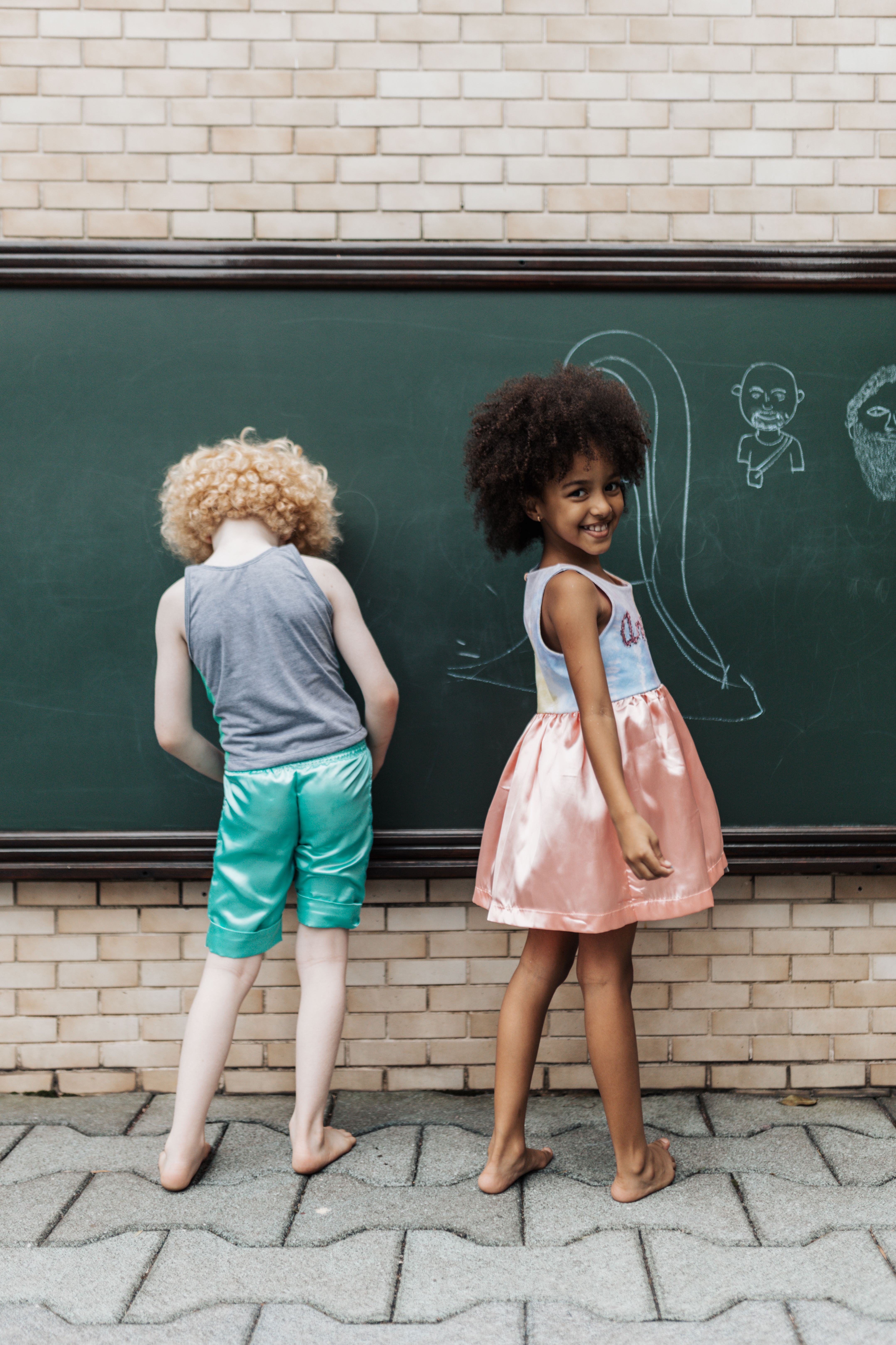 Kids by the Board at School · Free Stock Photo