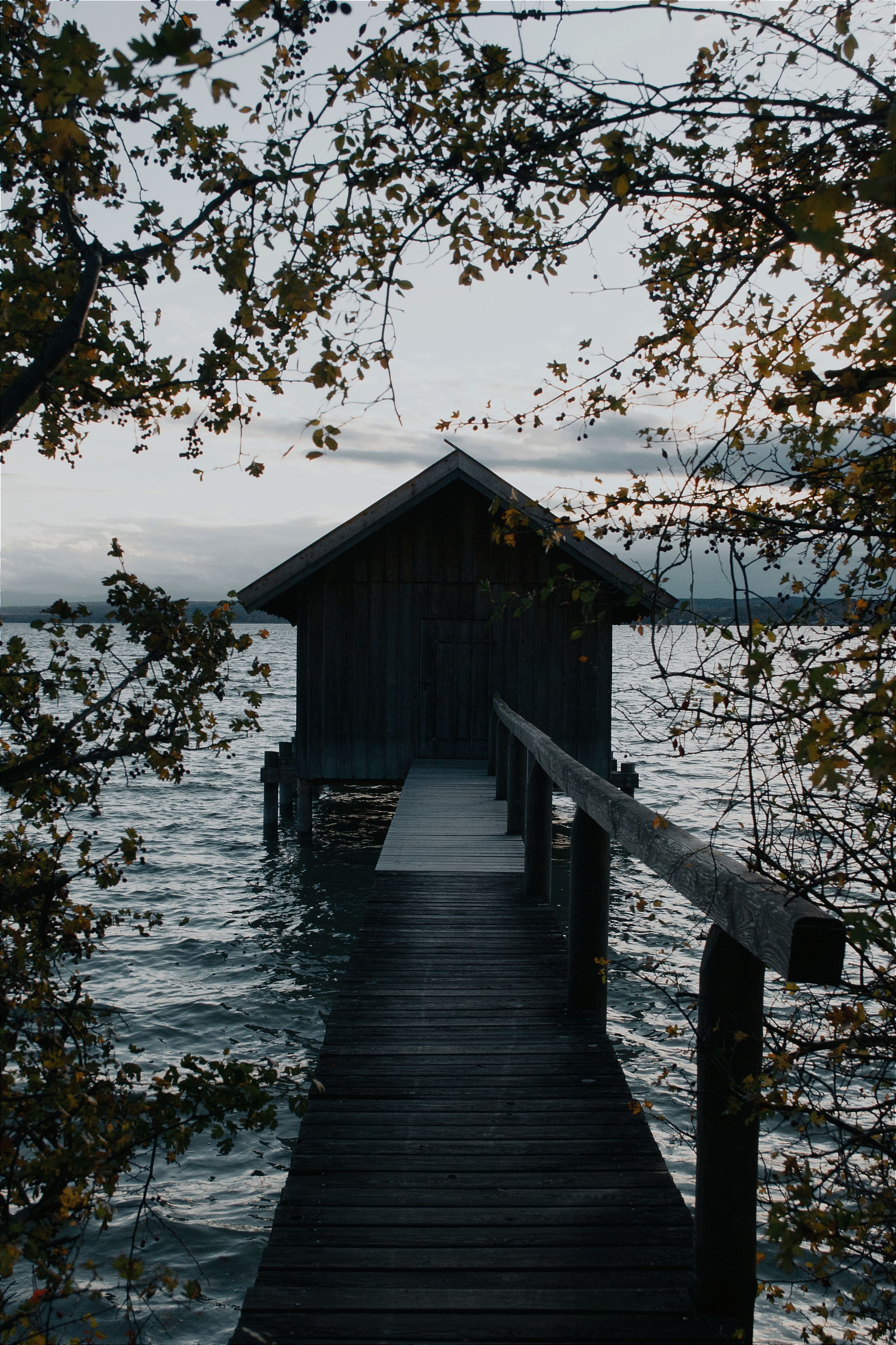 Old Wooden Shed at the End of the Jetty on the Lake · Free Stock Photo