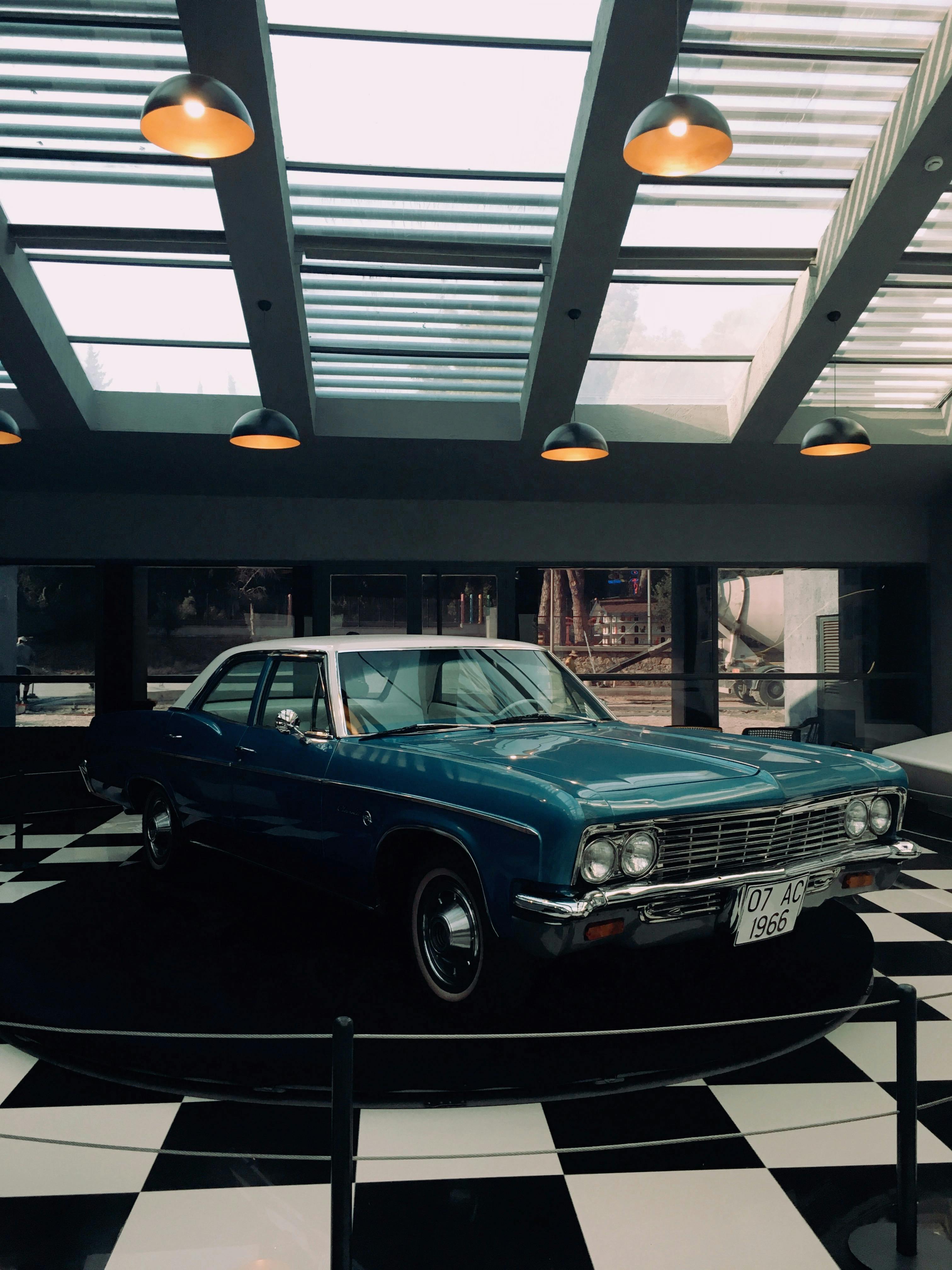 Blue Chevrolet Biscayne at Exhibition · Free Stock Photo