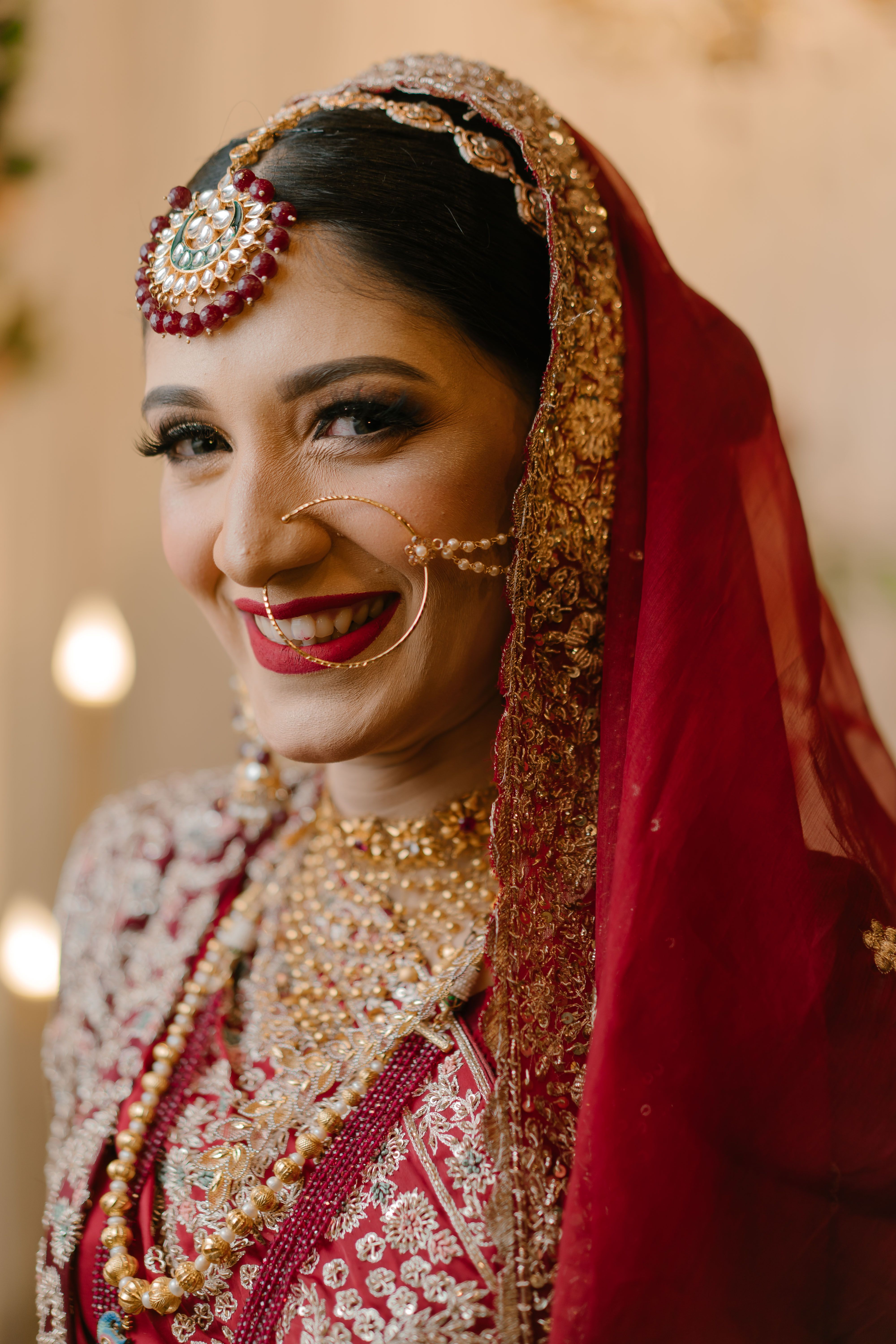 Portrait of a Smiling Bride in Traditional Indian Wedding Dress and ...