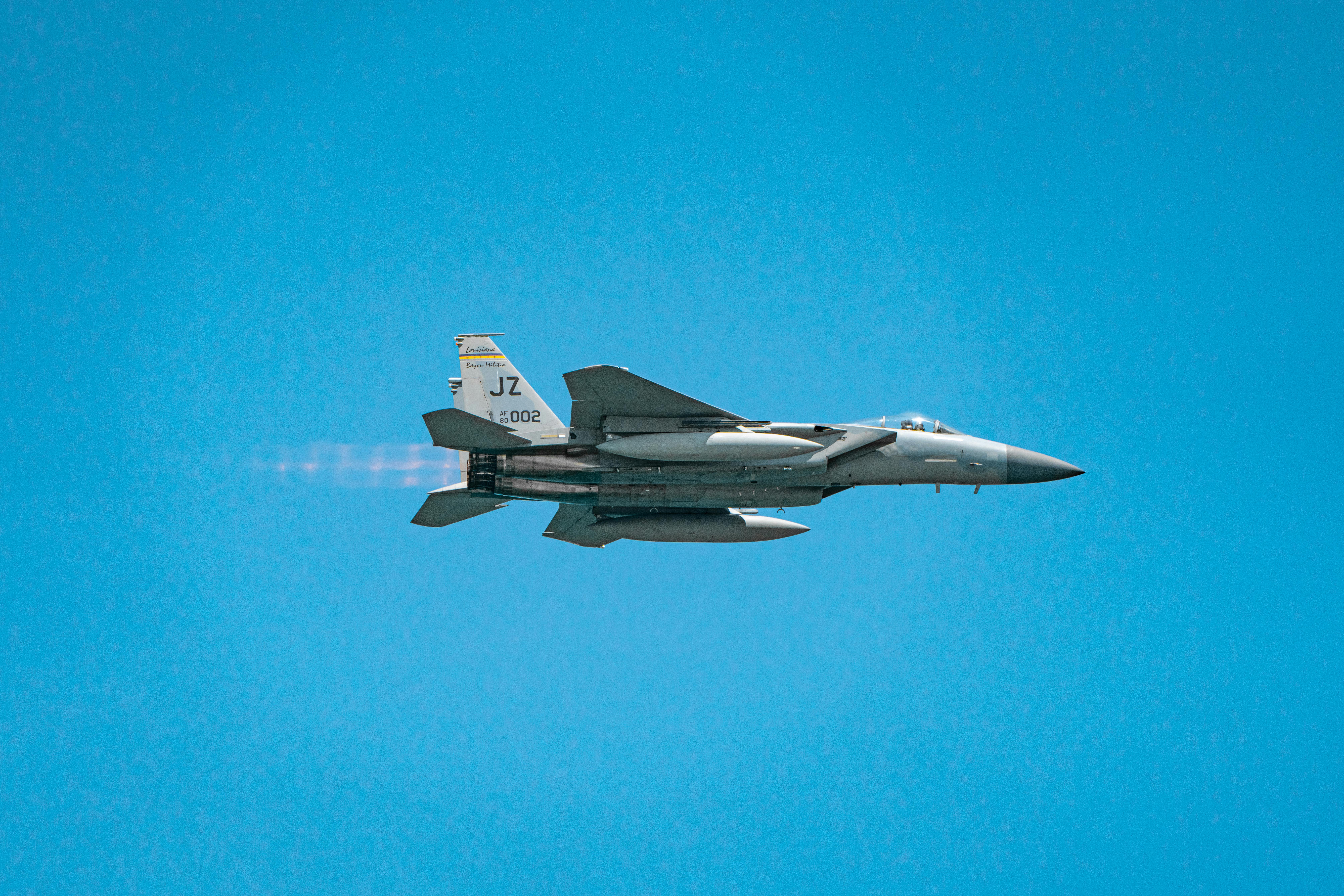 Military Jet in Blue Sky · Free Stock Photo