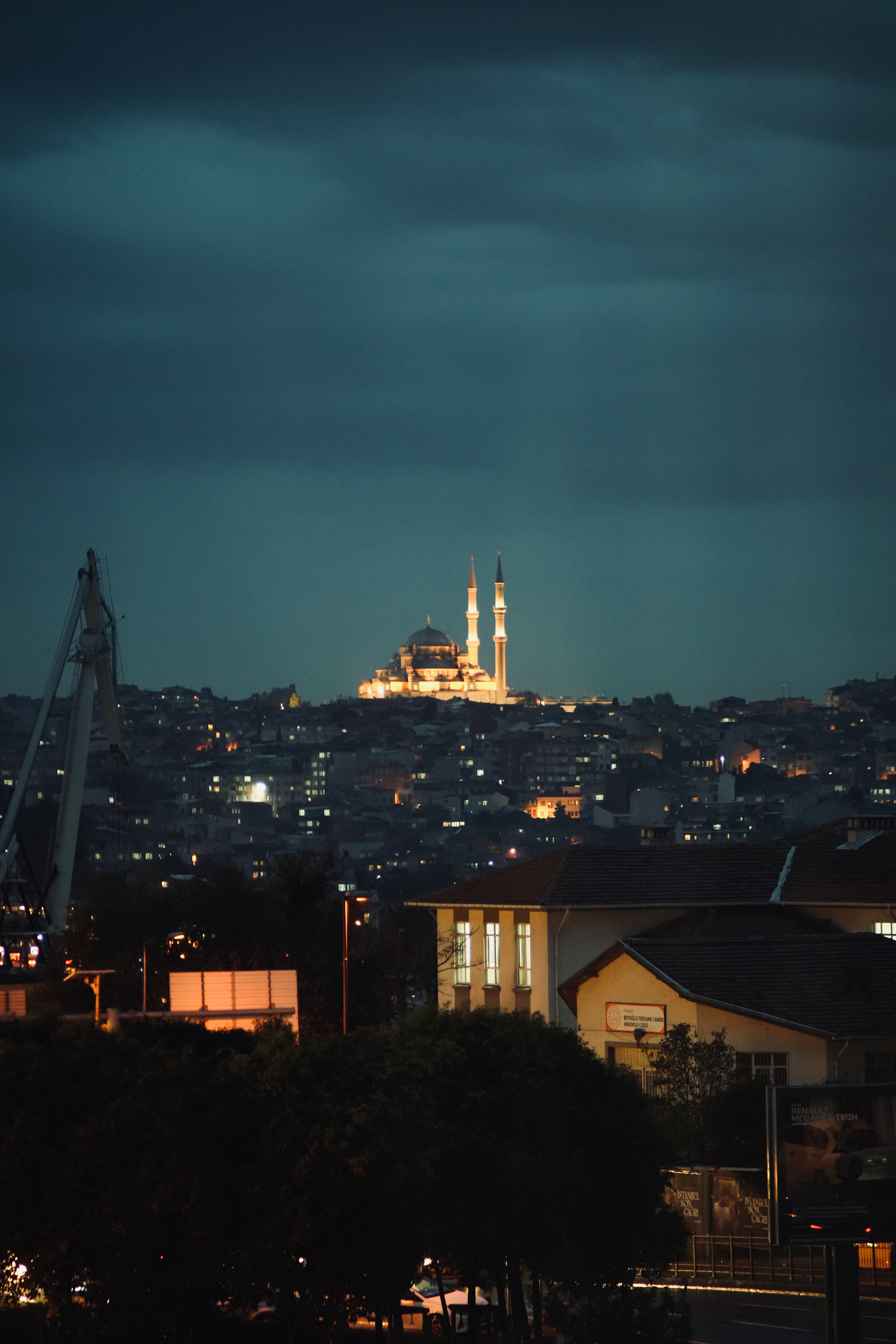 Skyline of Istanbul with an Illuminated Mosque at Night · Free Stock Photo