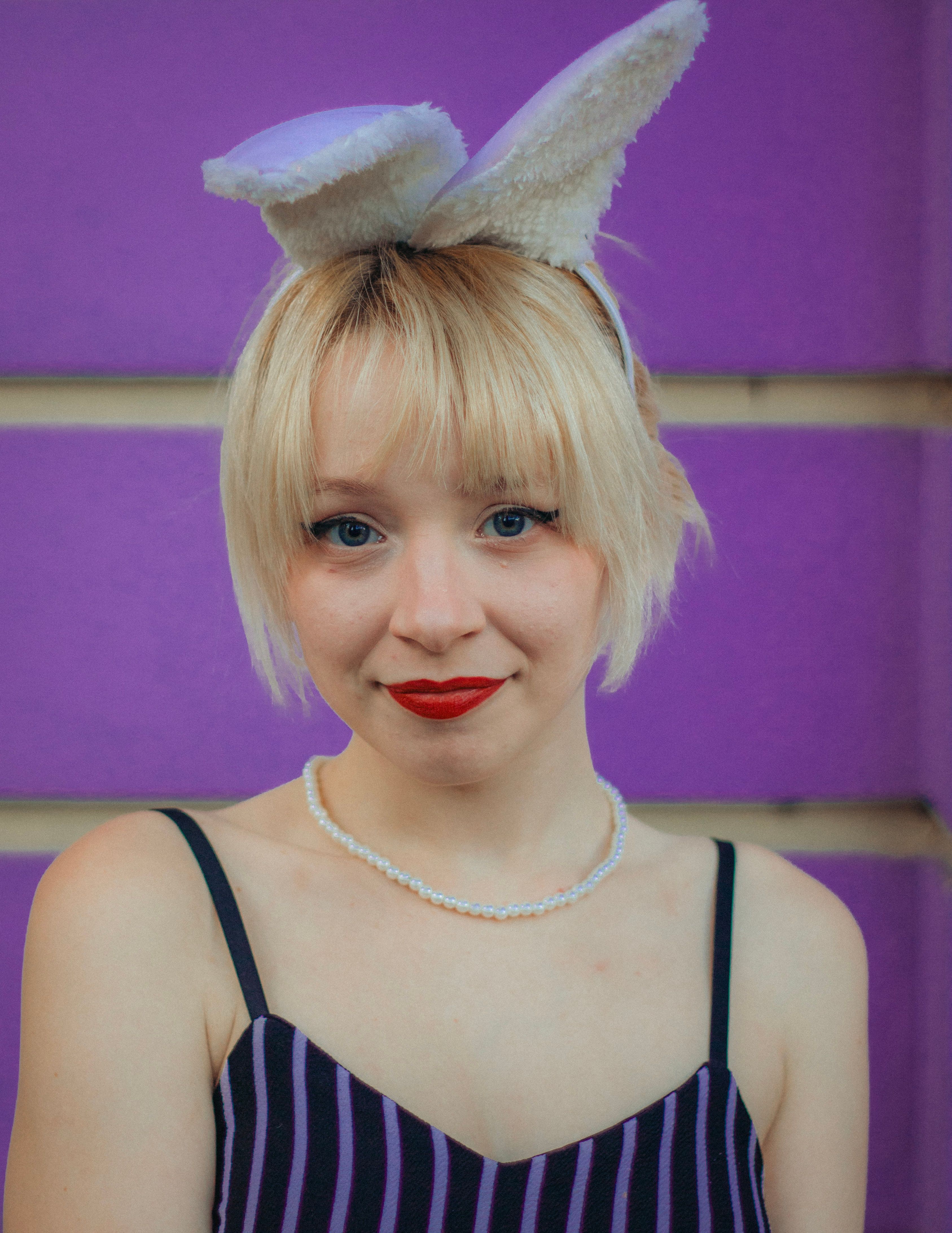 Smiling Woman with Rabbit Ears · Free Stock Photo